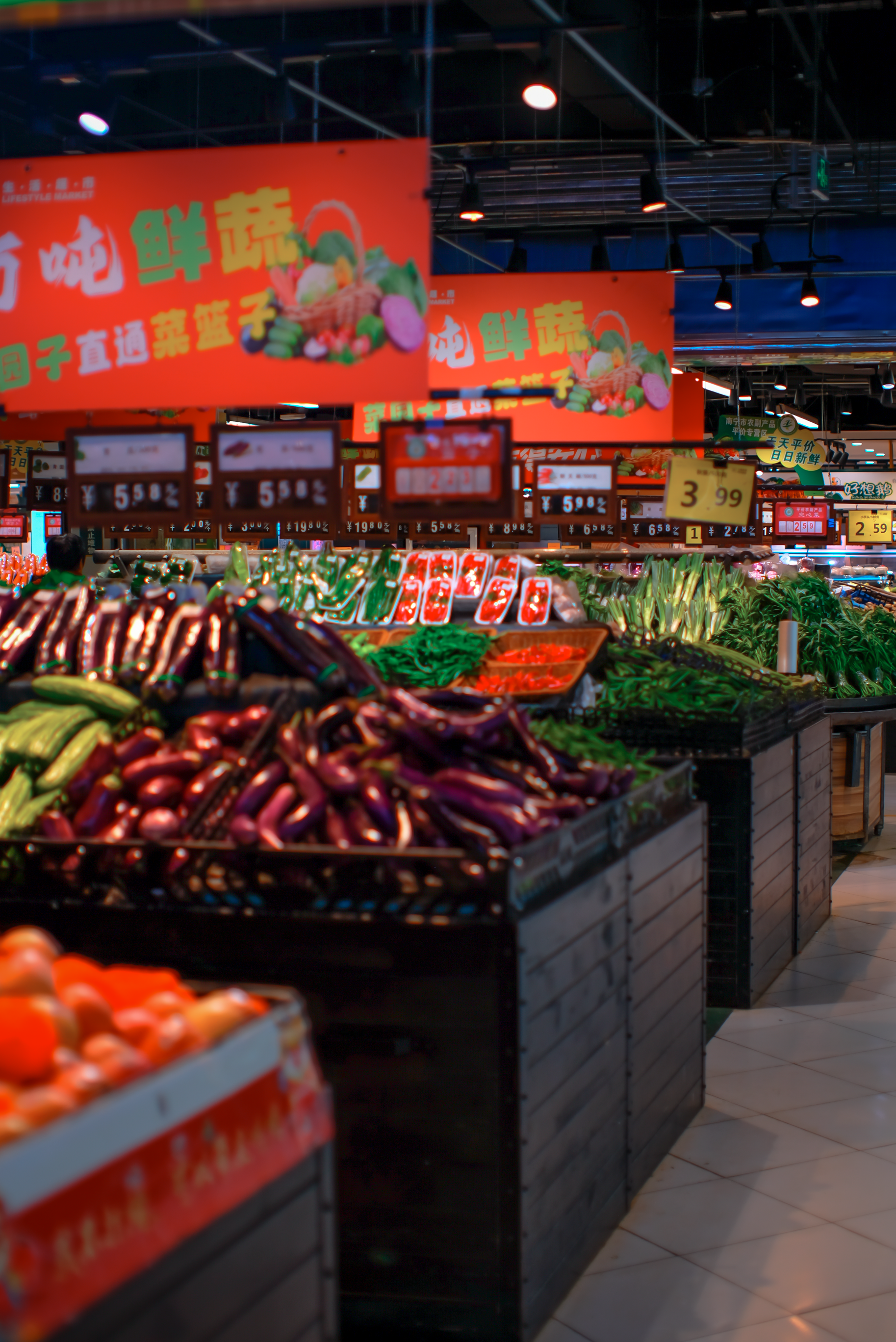 Vibrant Vegetable Aisle in Asian Supermarket · Free Stock Photo