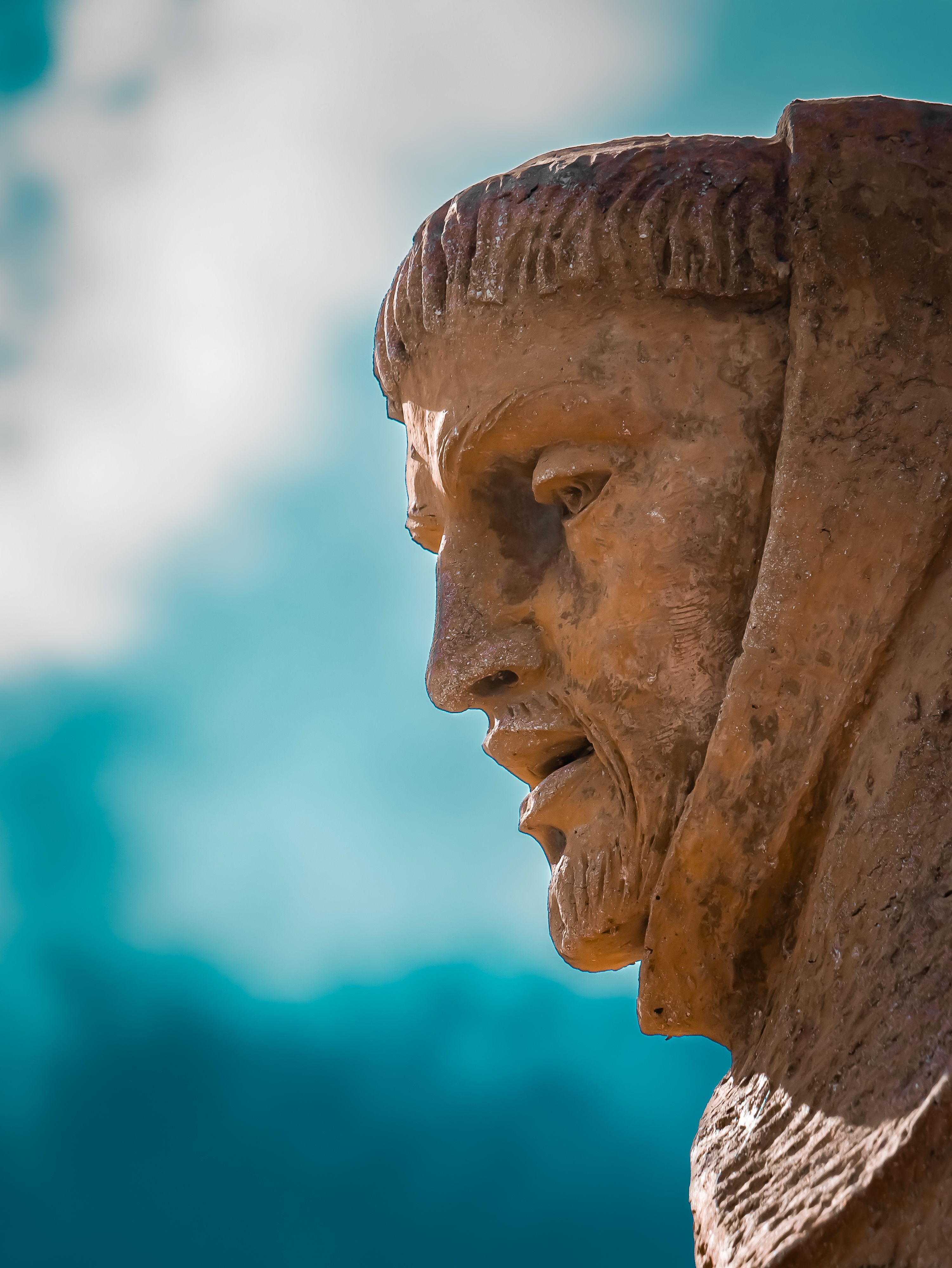 Weathered Stone Sculpture of Medieval Monk · Free Stock Photo