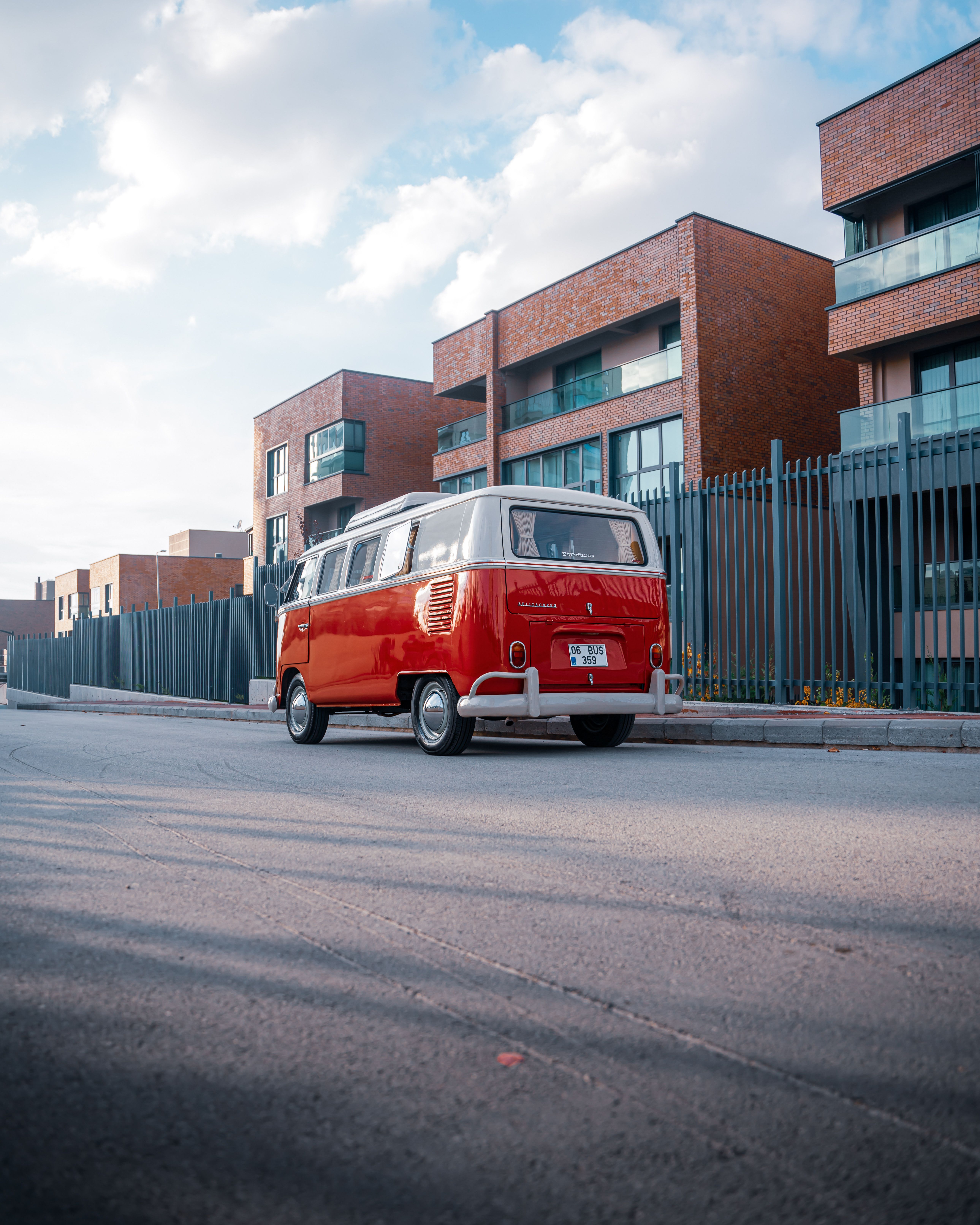 Classic Red Volkswagen Minibus in Modern Ankara Street · Free Stock Photo