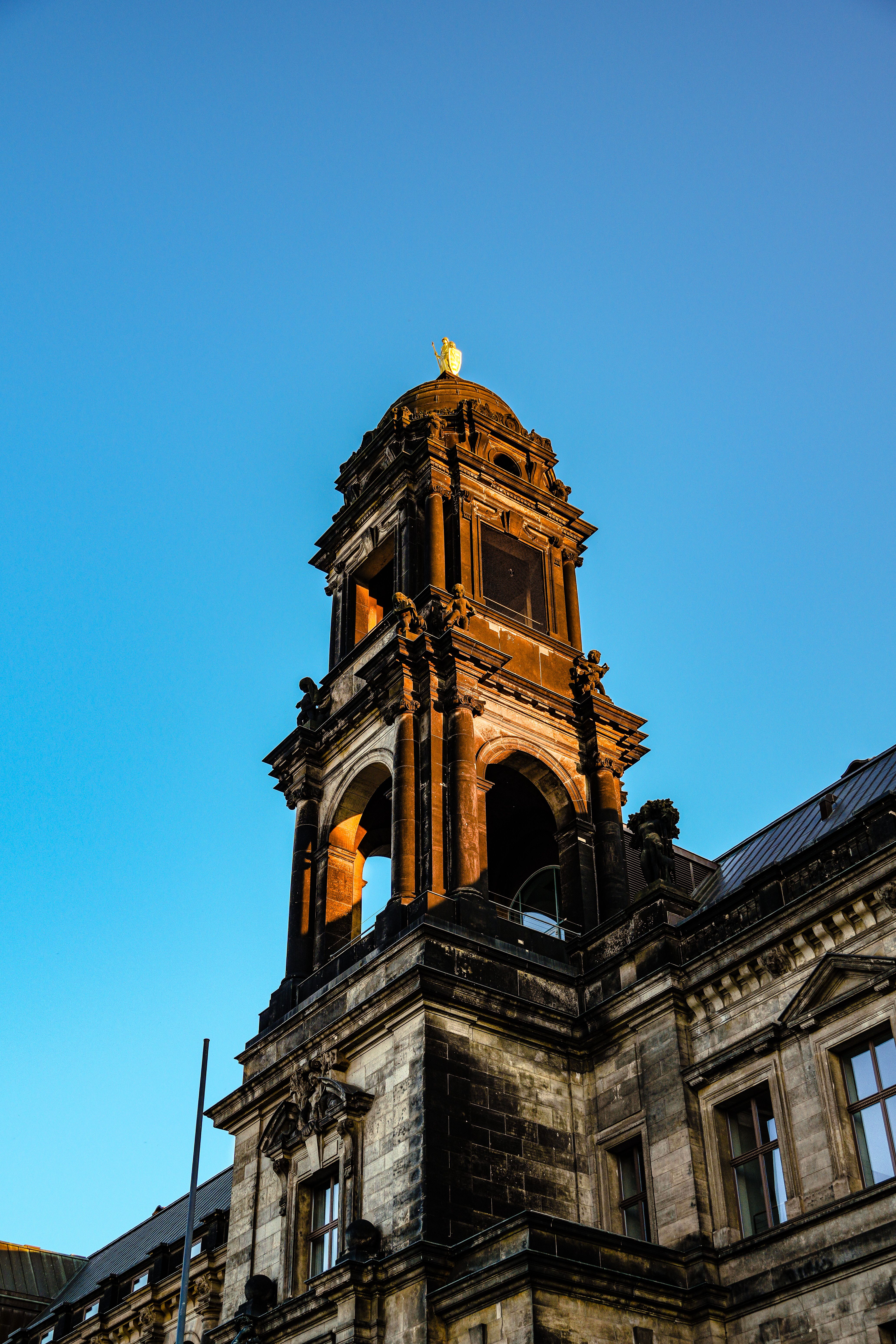 Historic Tower against Clear Blue Sky in Germany · Free Stock Photo