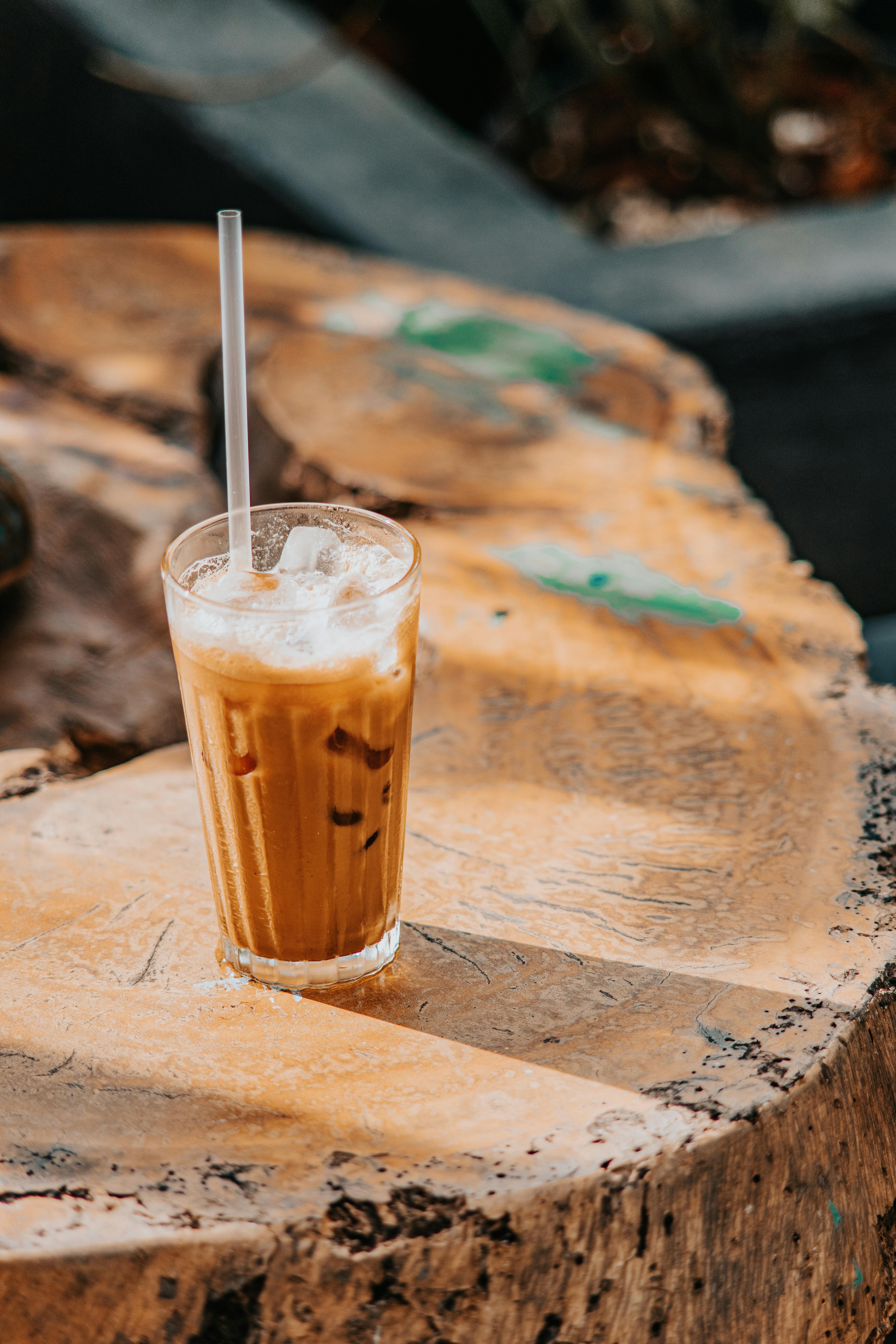 Iced Coffee on Rustic Wooden Table Outdoors · Free Stock Photo
