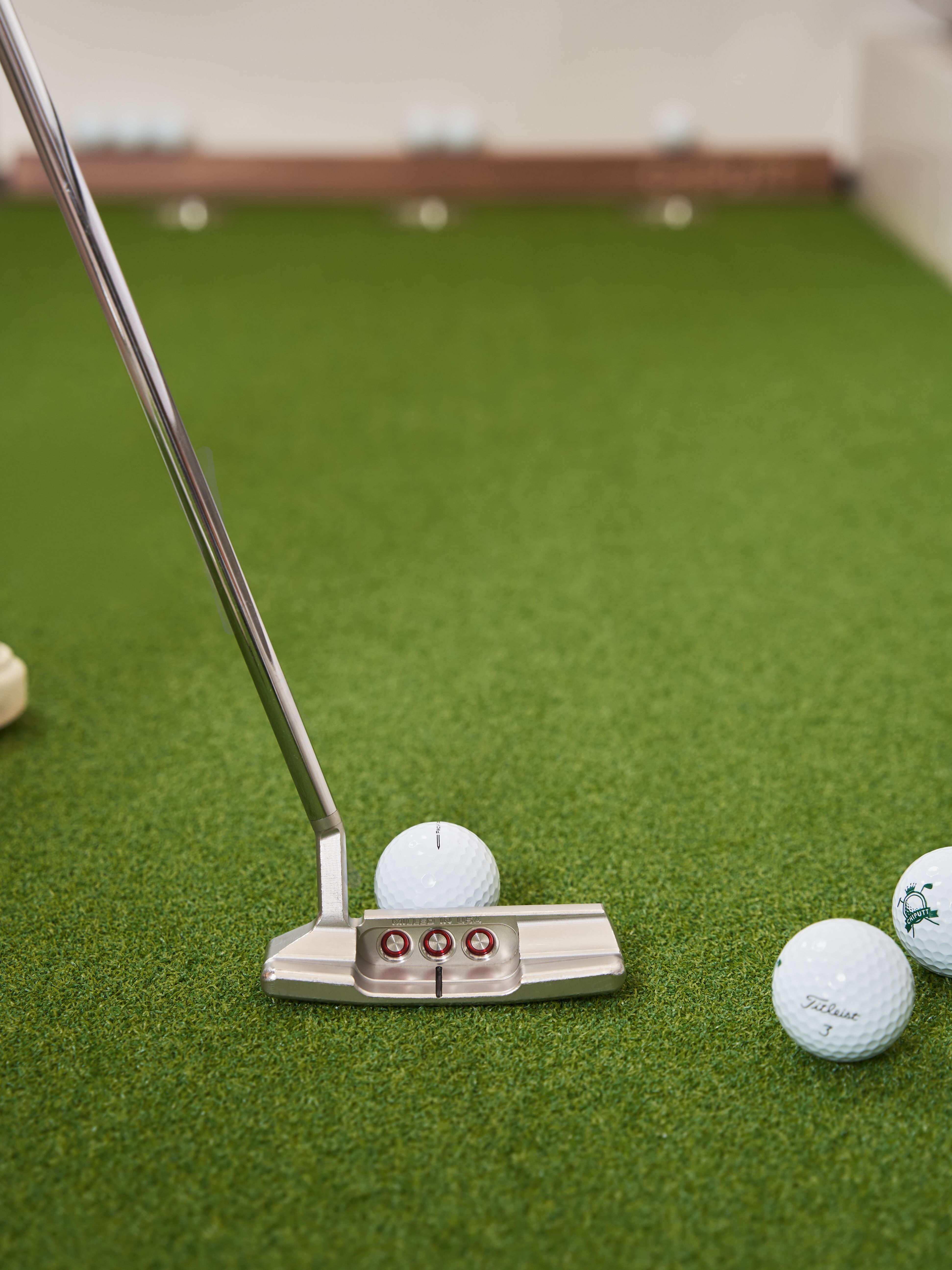Indoor Golf Putting Practice on Artificial Turf · Free Stock Photo
