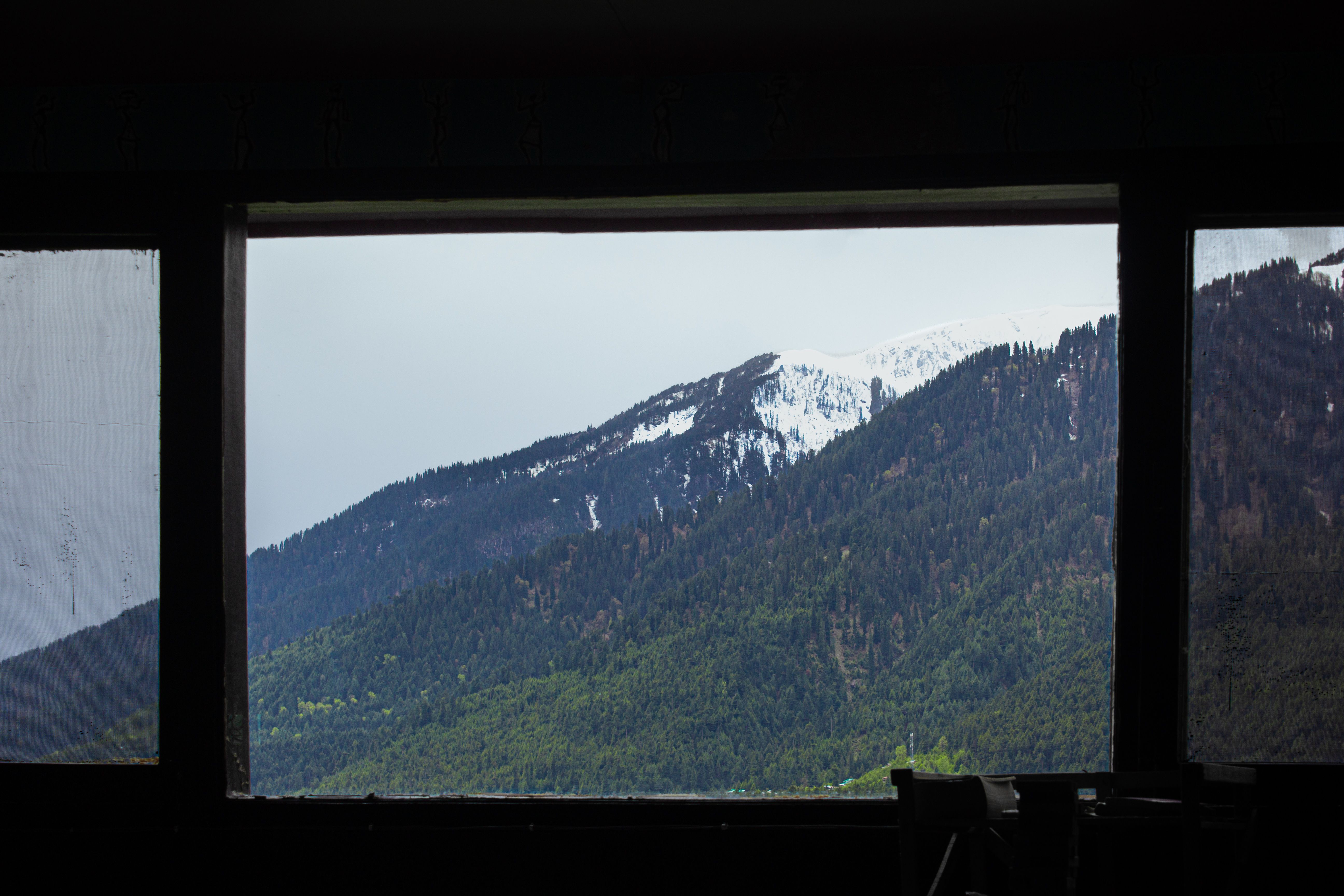 Scenic Mountain View from a Window · Free Stock Photo