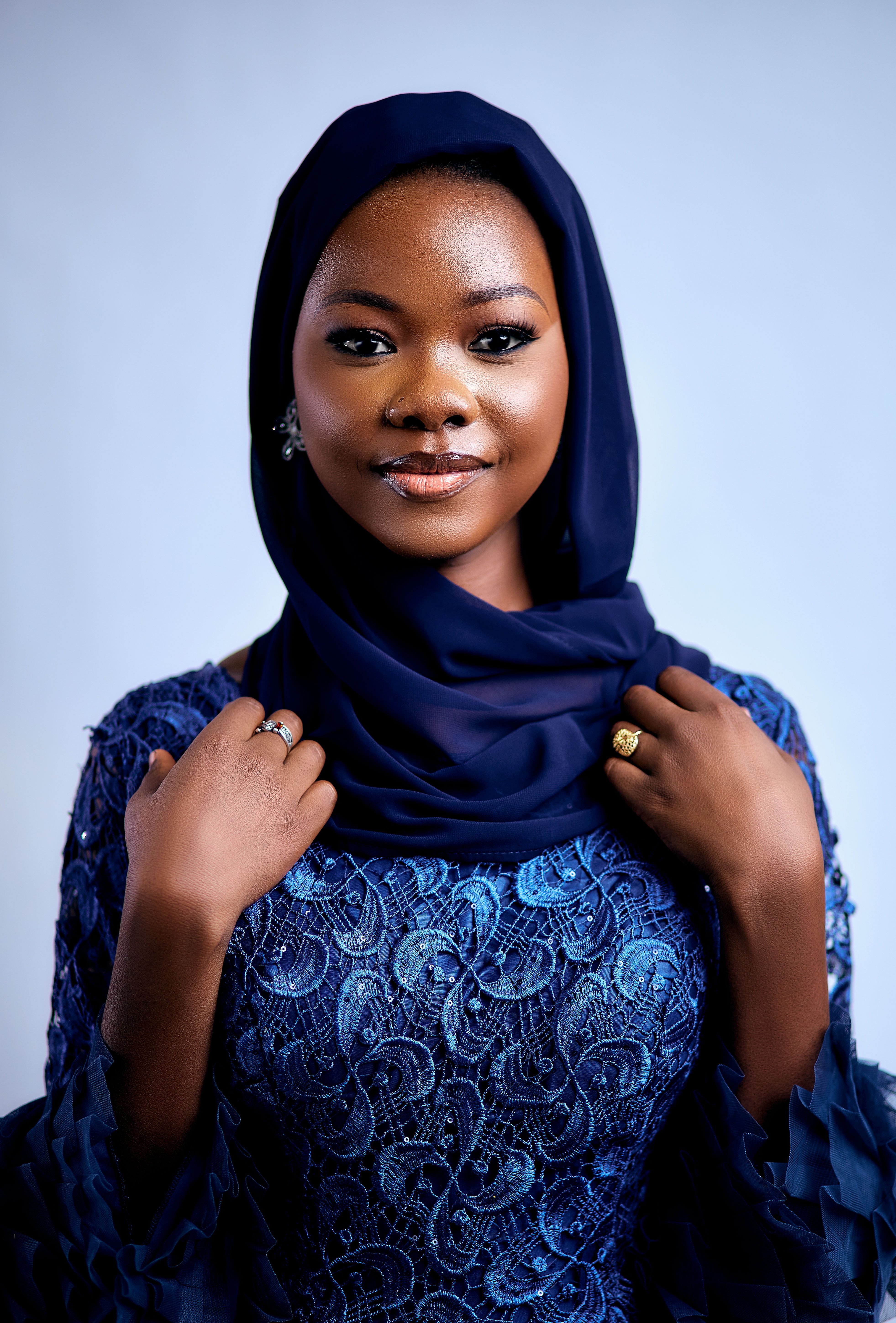Elegant Portrait of Woman in Blue Hijab · Free Stock Photo