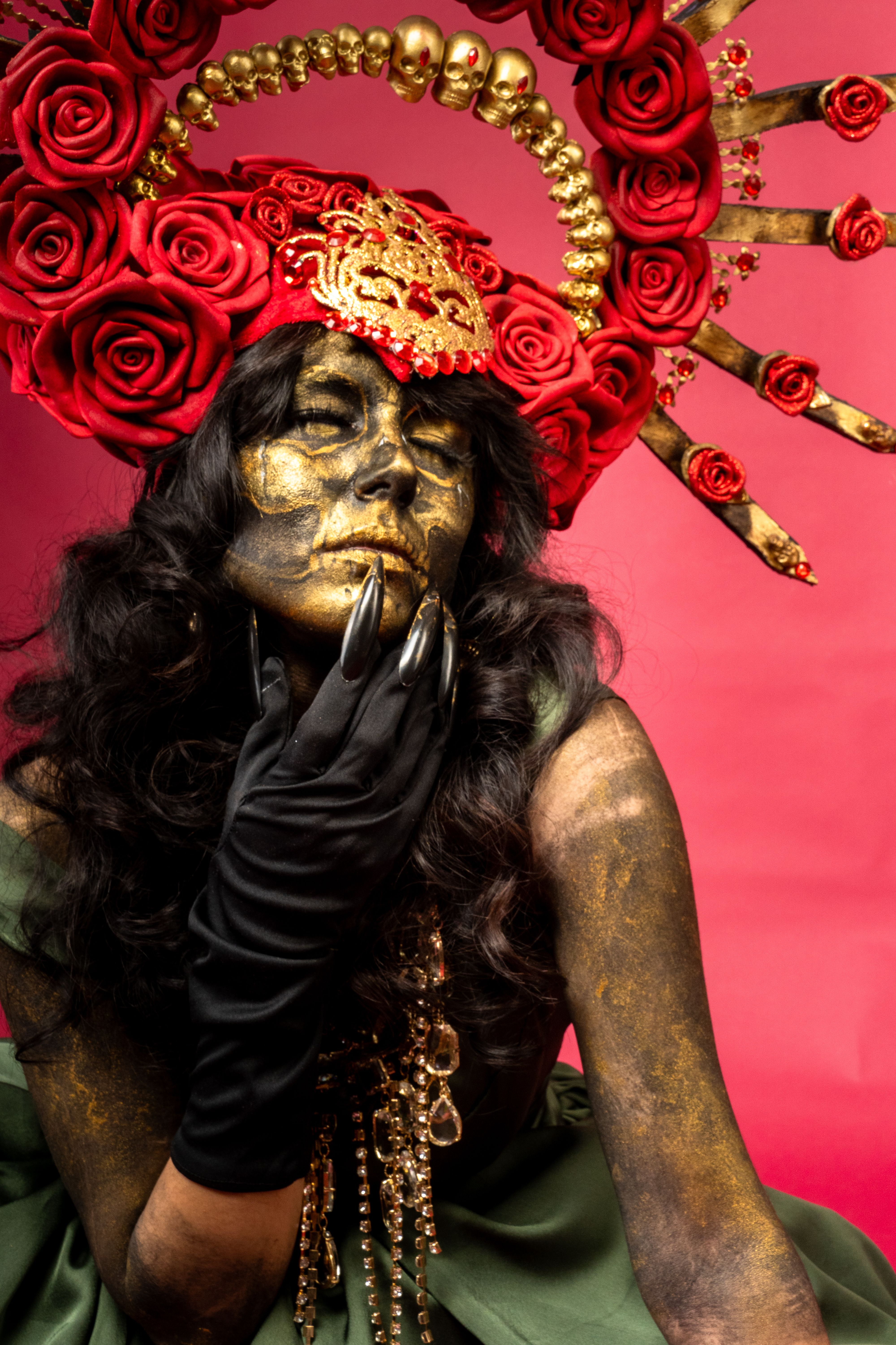 Elegant Catrina with Gold Makeup and Red Roses · Free Stock Photo