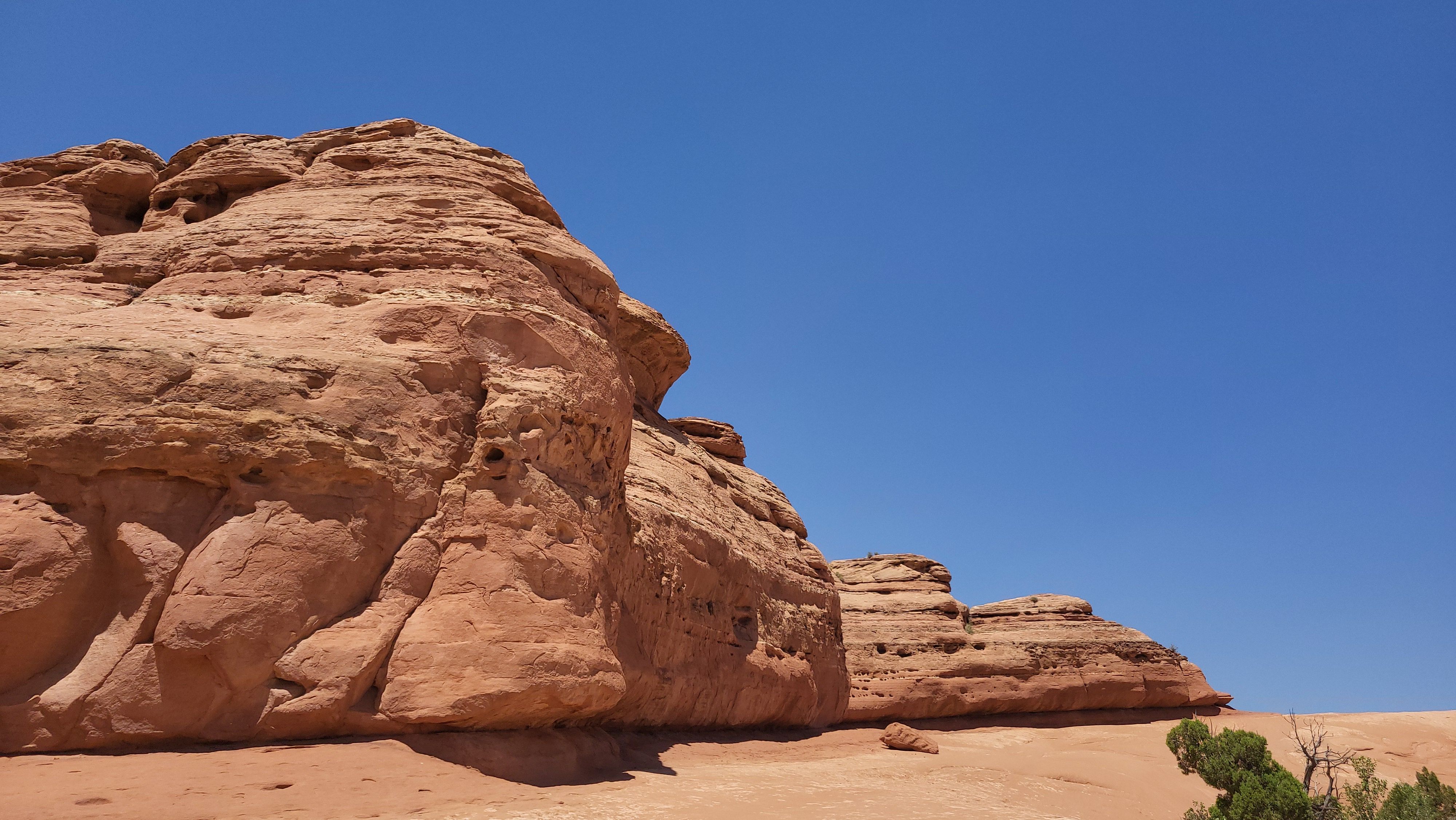 Stunning Red Rock Cliff Under Clear Blue Sky · Free Stock Photo