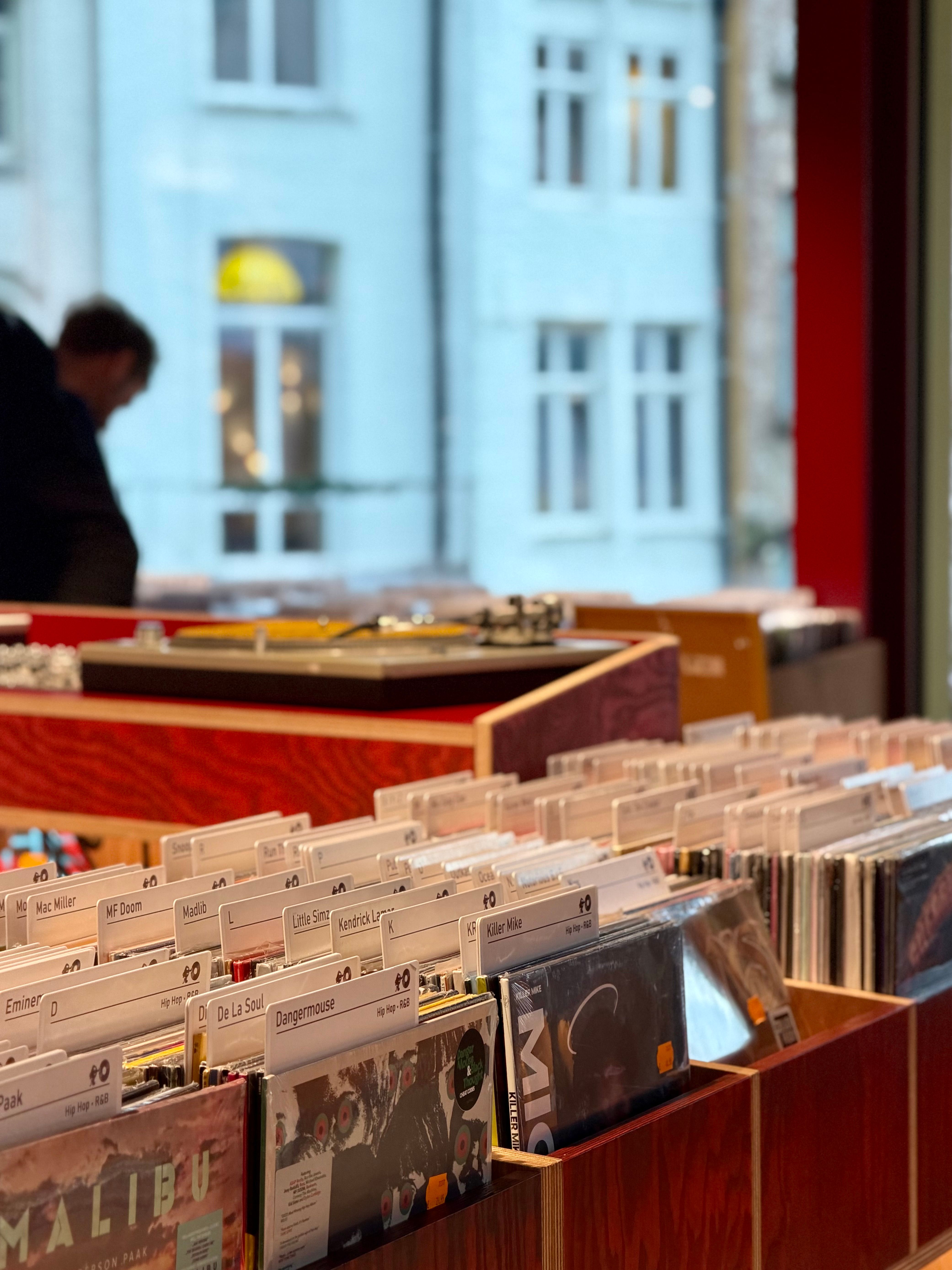 Vinyl Records in a Gent Storefront Display · Free Stock Photo