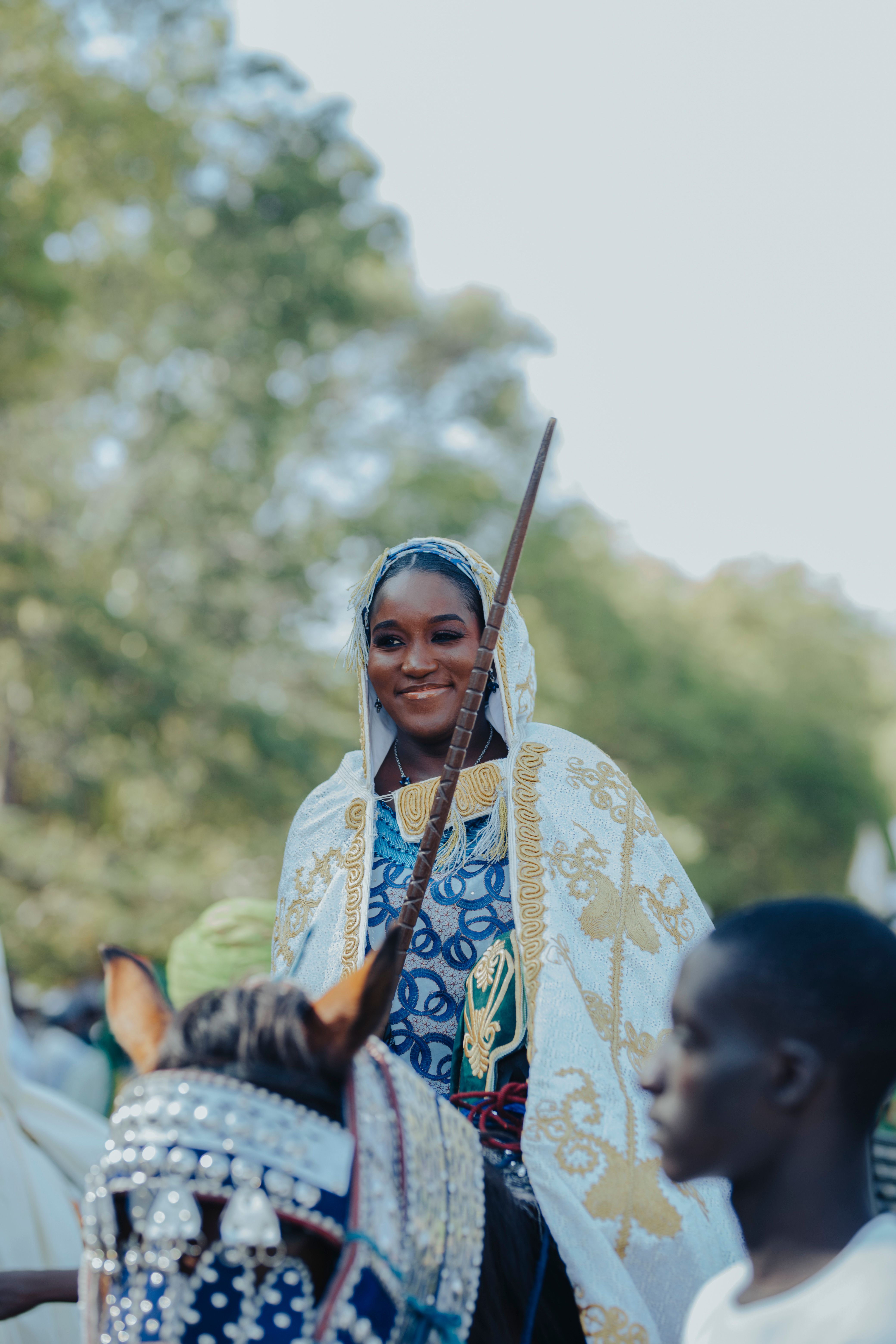 Traditional African Woman on Decorated Horseback · Free Stock Photo