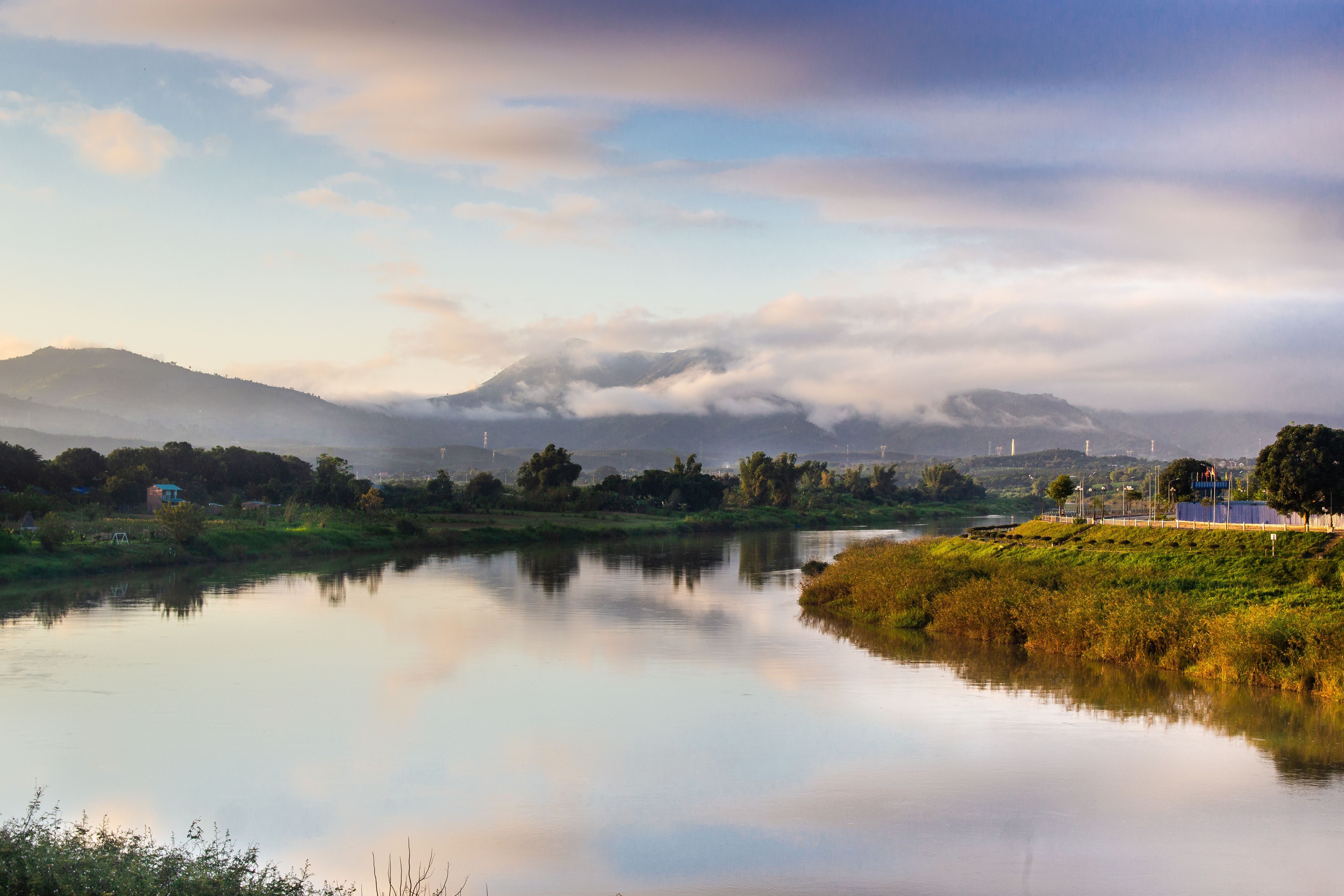 Serene Landscape of Kon Tum with Reflective River · Free Stock Photo