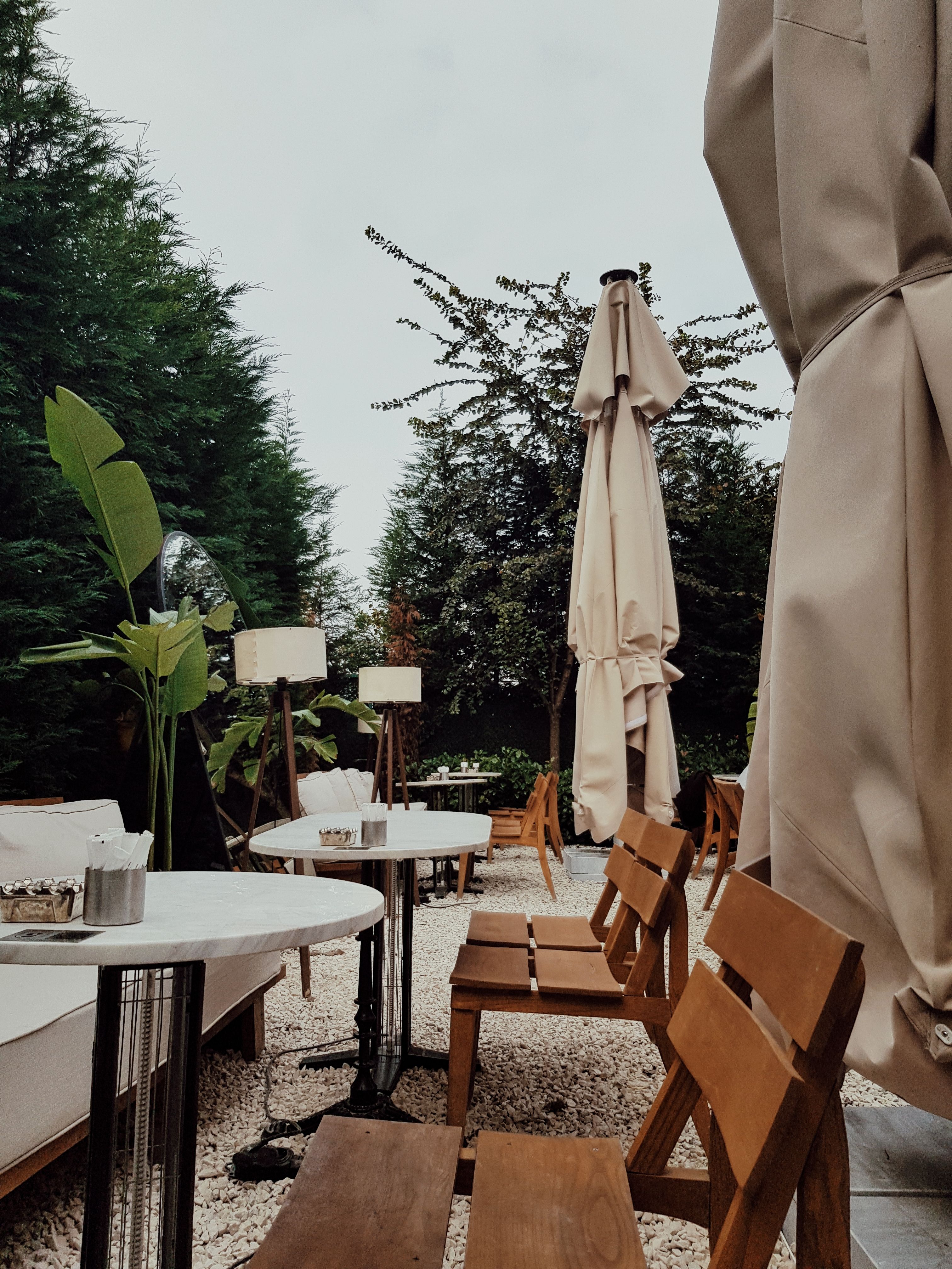 Charming Outdoor Cafe with Rustic Decor · Free Stock Photo
