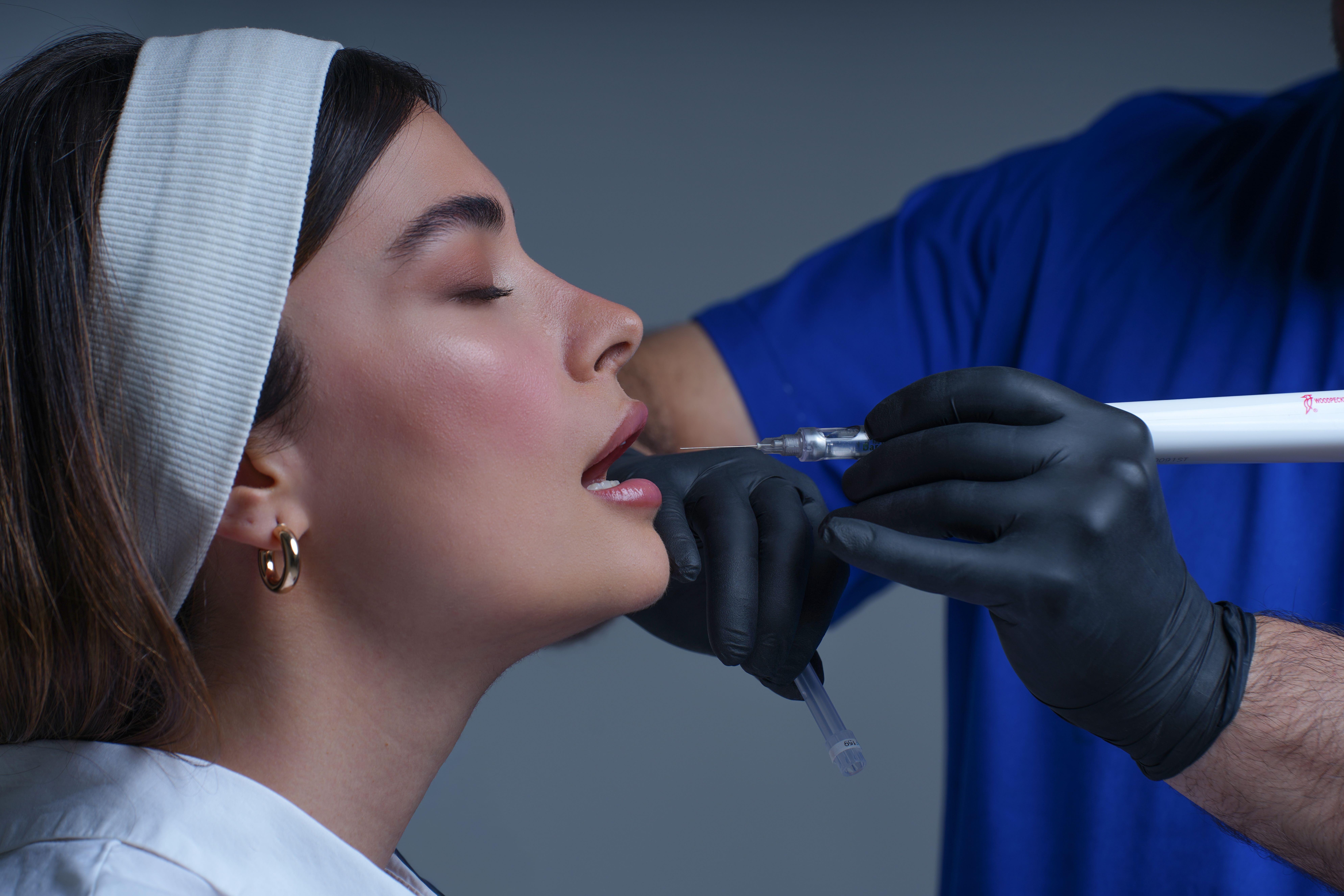 Woman Receiving Facial Cosmetic Procedure · Free Stock Photo