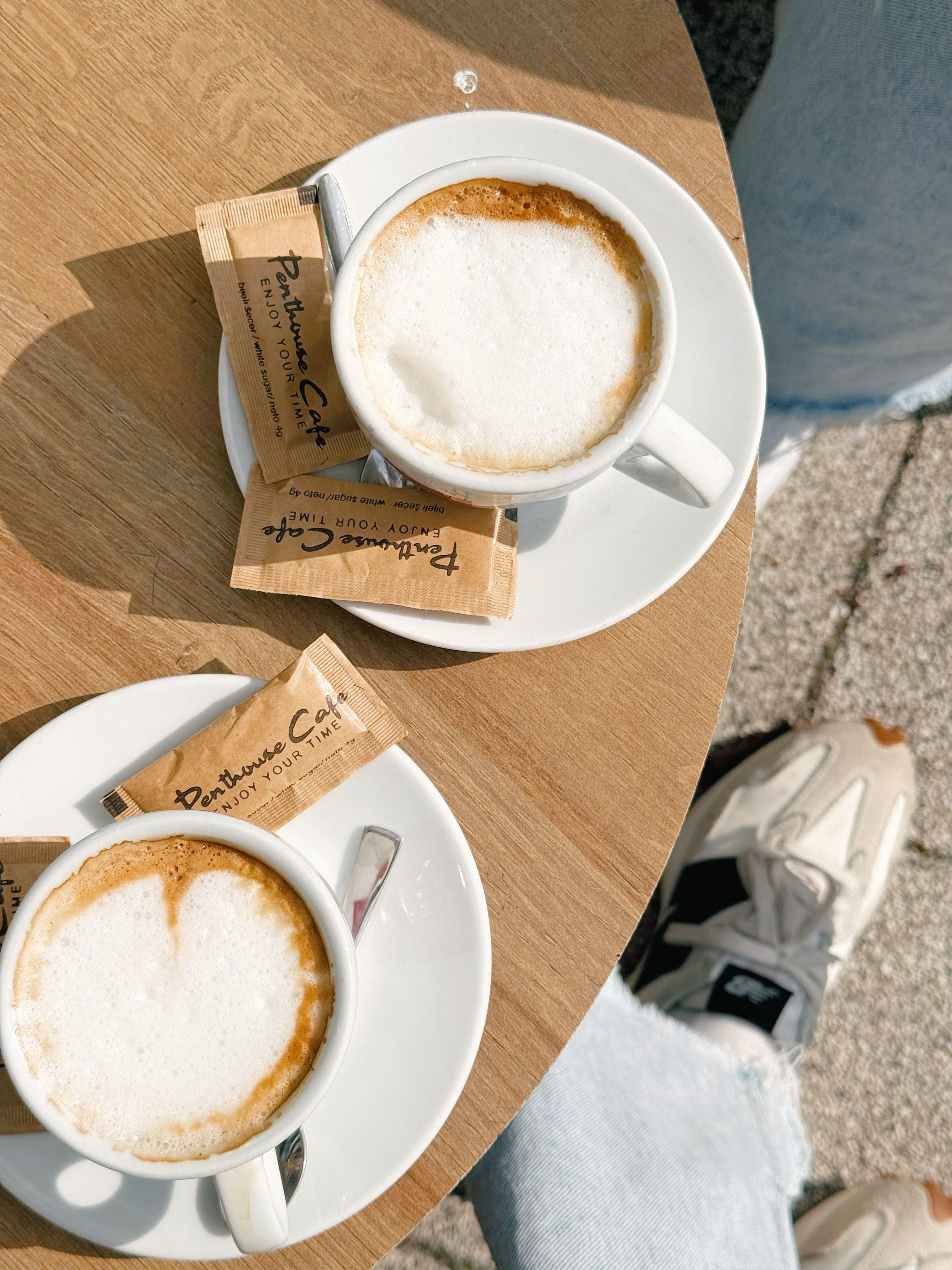 Two Cappuccinos On Outdoor Cafe Table Free Stock Photo