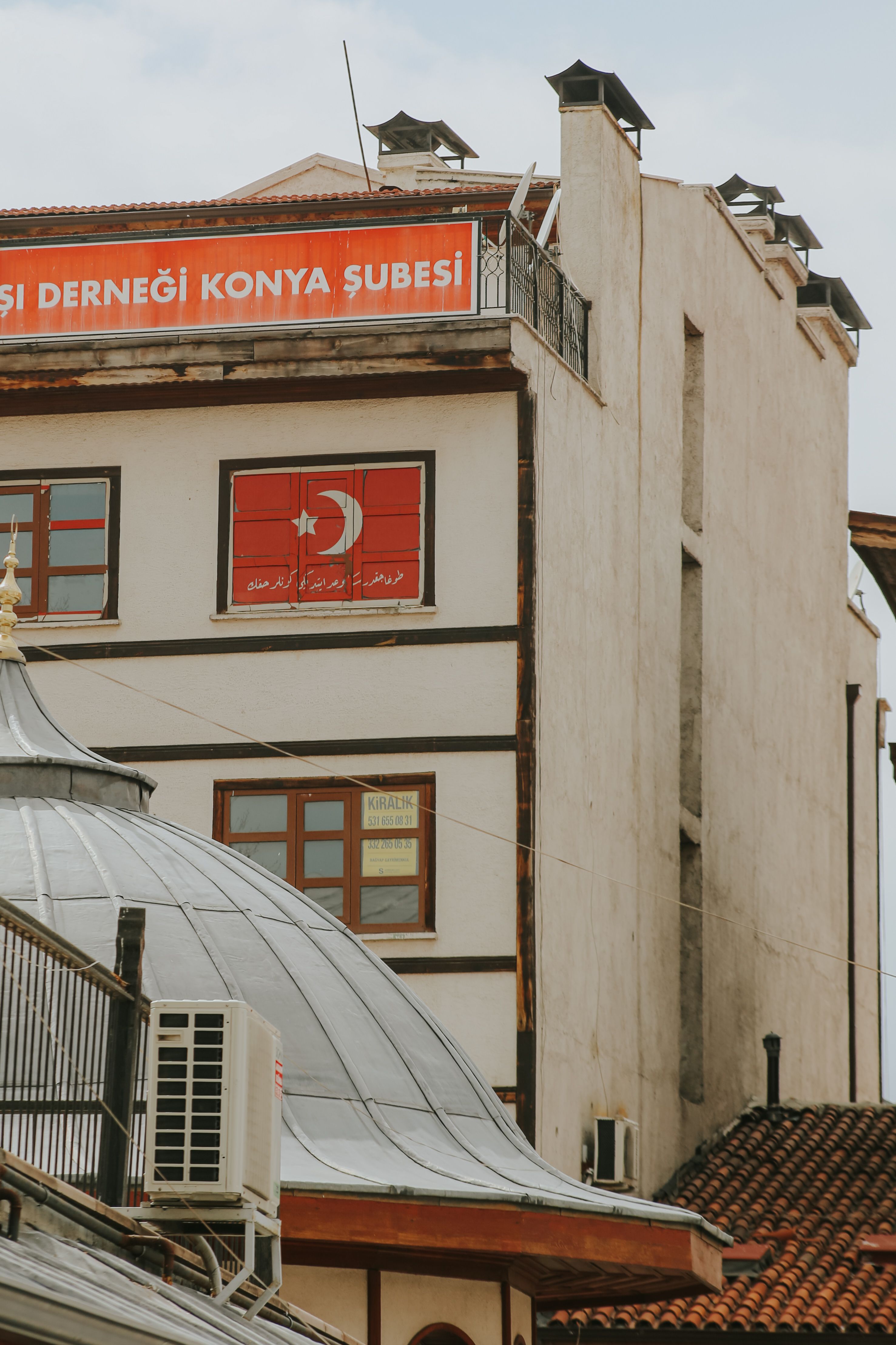 Turkish Architecture in Konya with Flag Display · Free Stock Photo