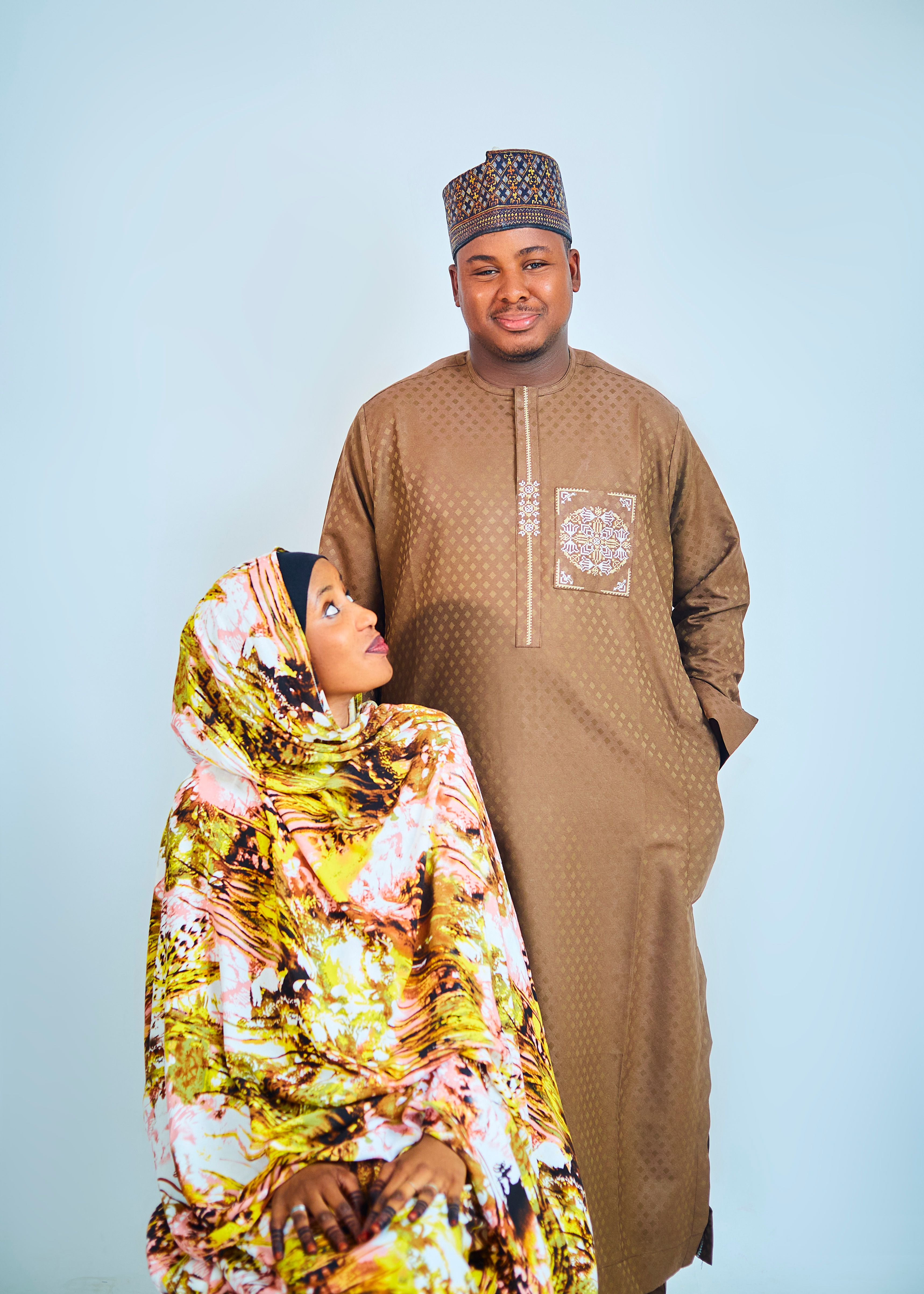 Cultural Portrait of Couple in Traditional Attire · Free Stock Photo