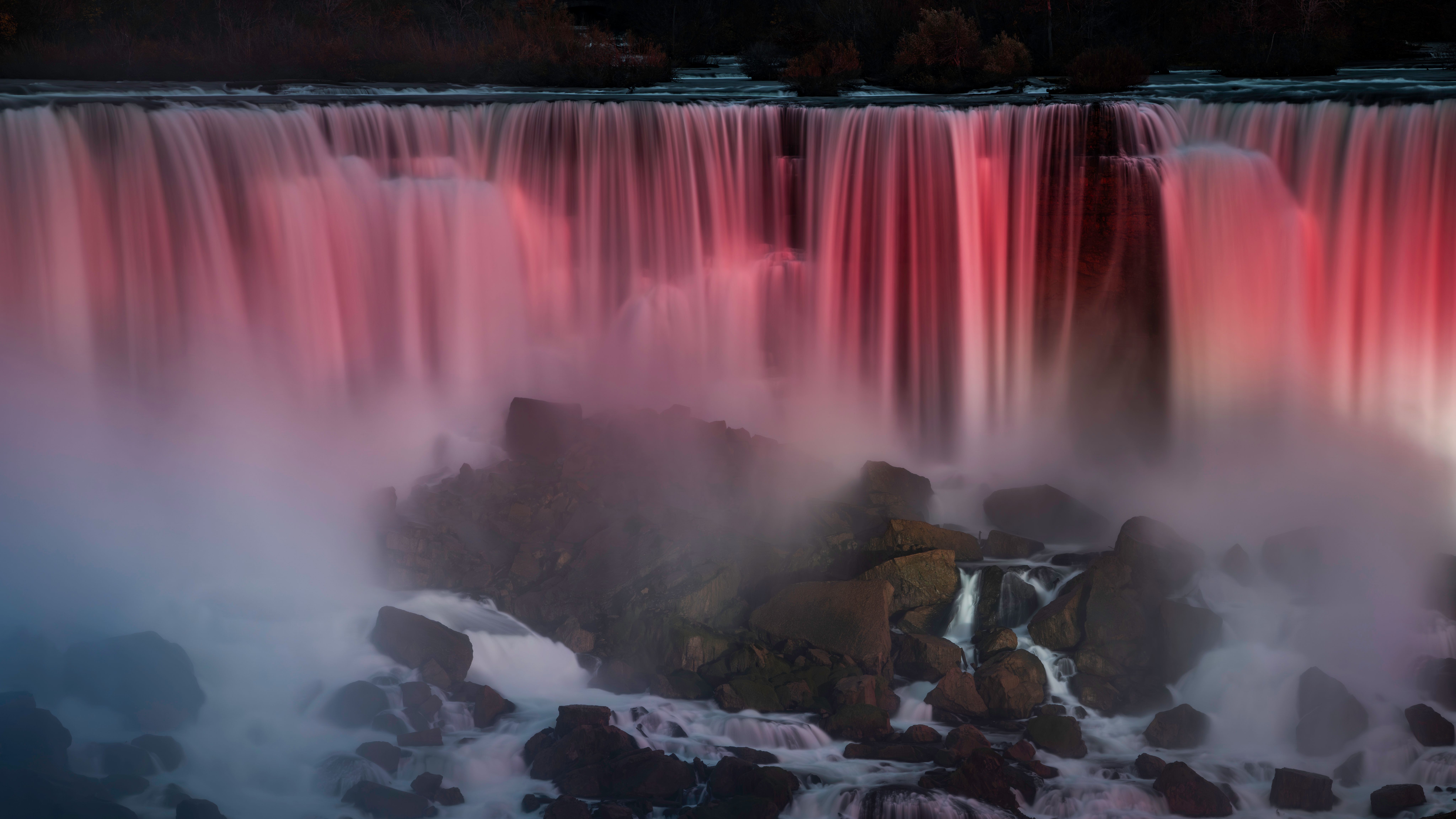 Stunning Long Exposure of Illuminated Waterfall at Dusk · Free Stock Photo