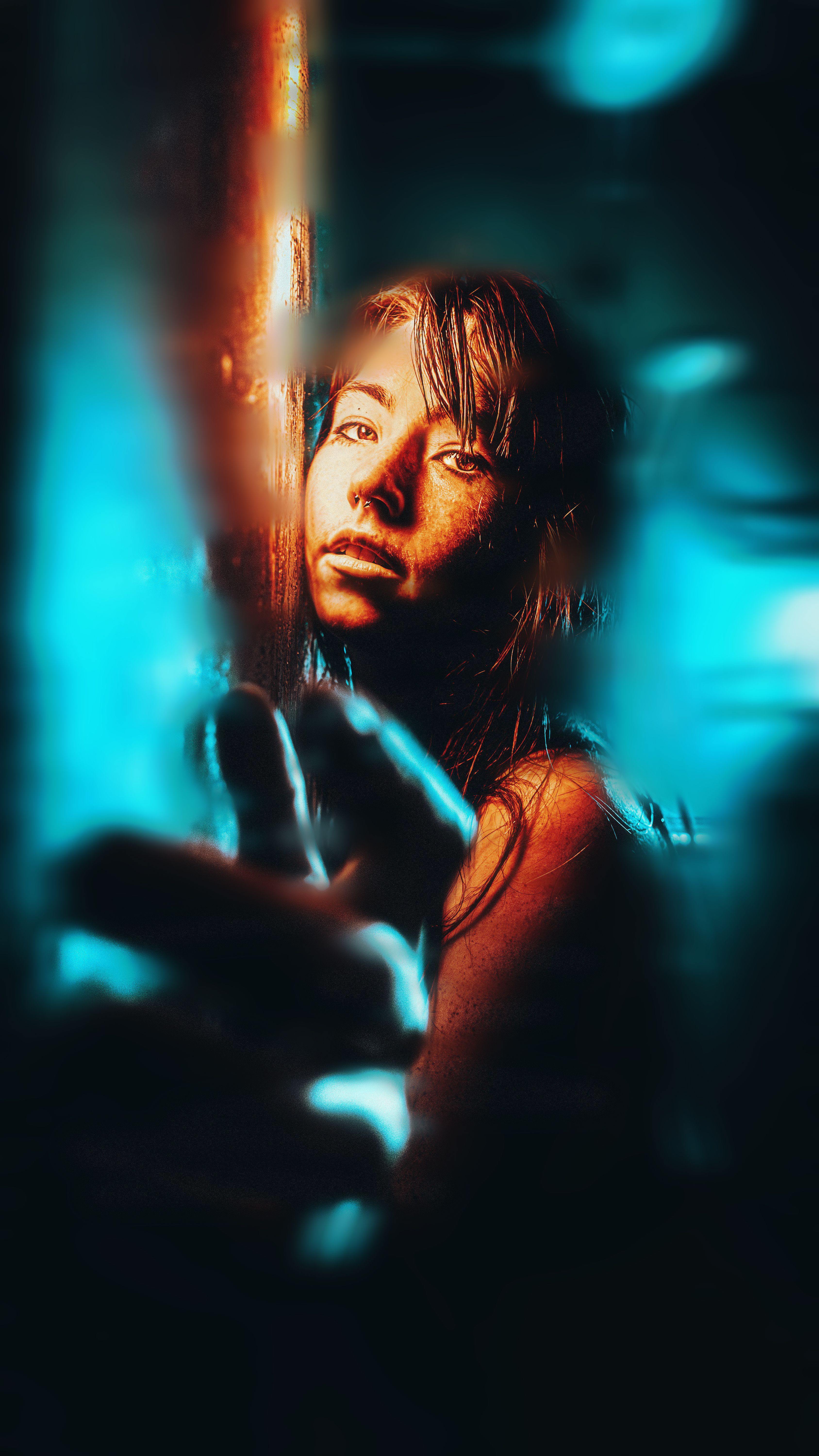 Moody Portrait of Woman Reaching Forward · Free Stock Photo