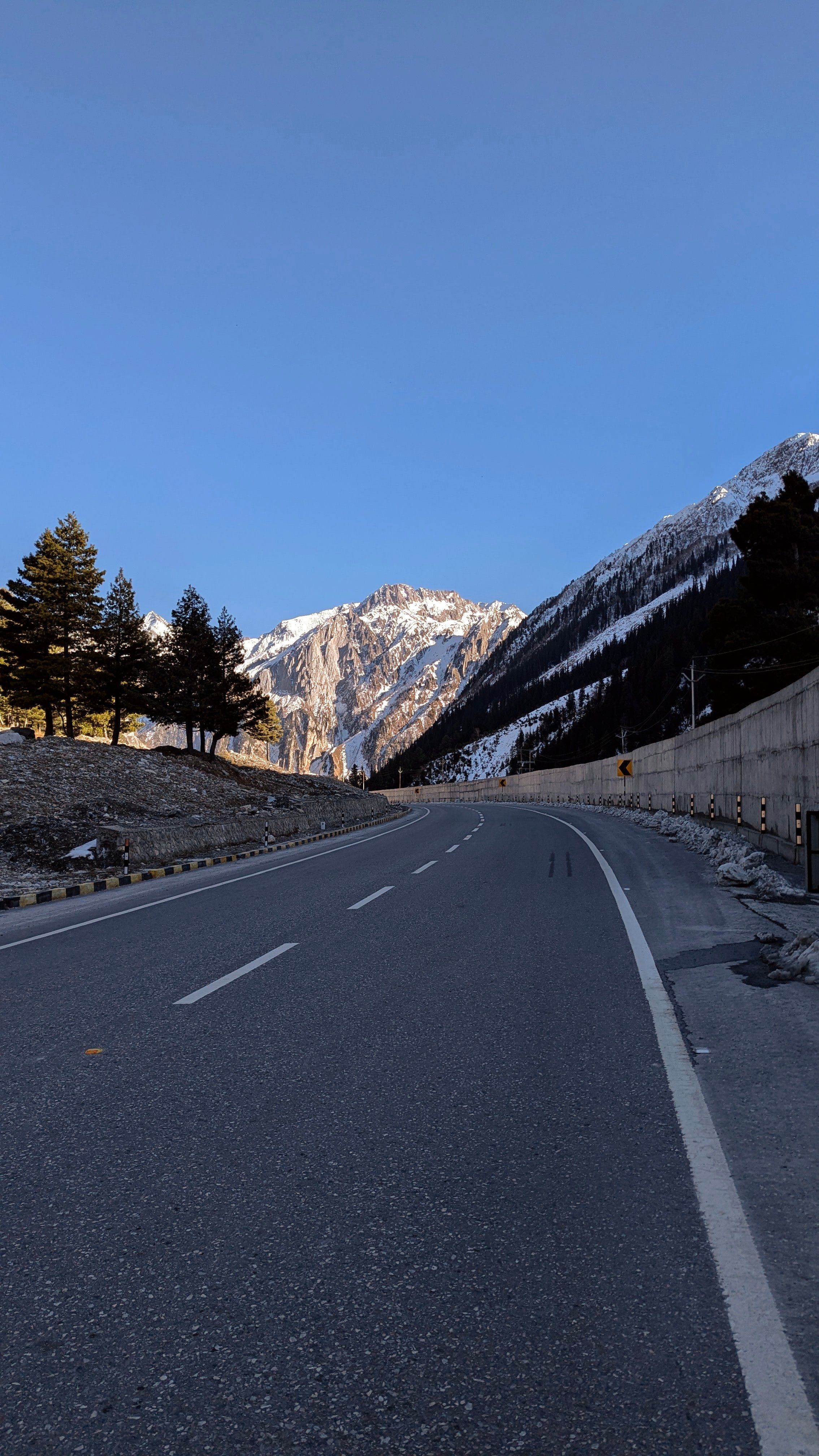 Mountain Highway with Snow-Capped Peaks · Free Stock Photo