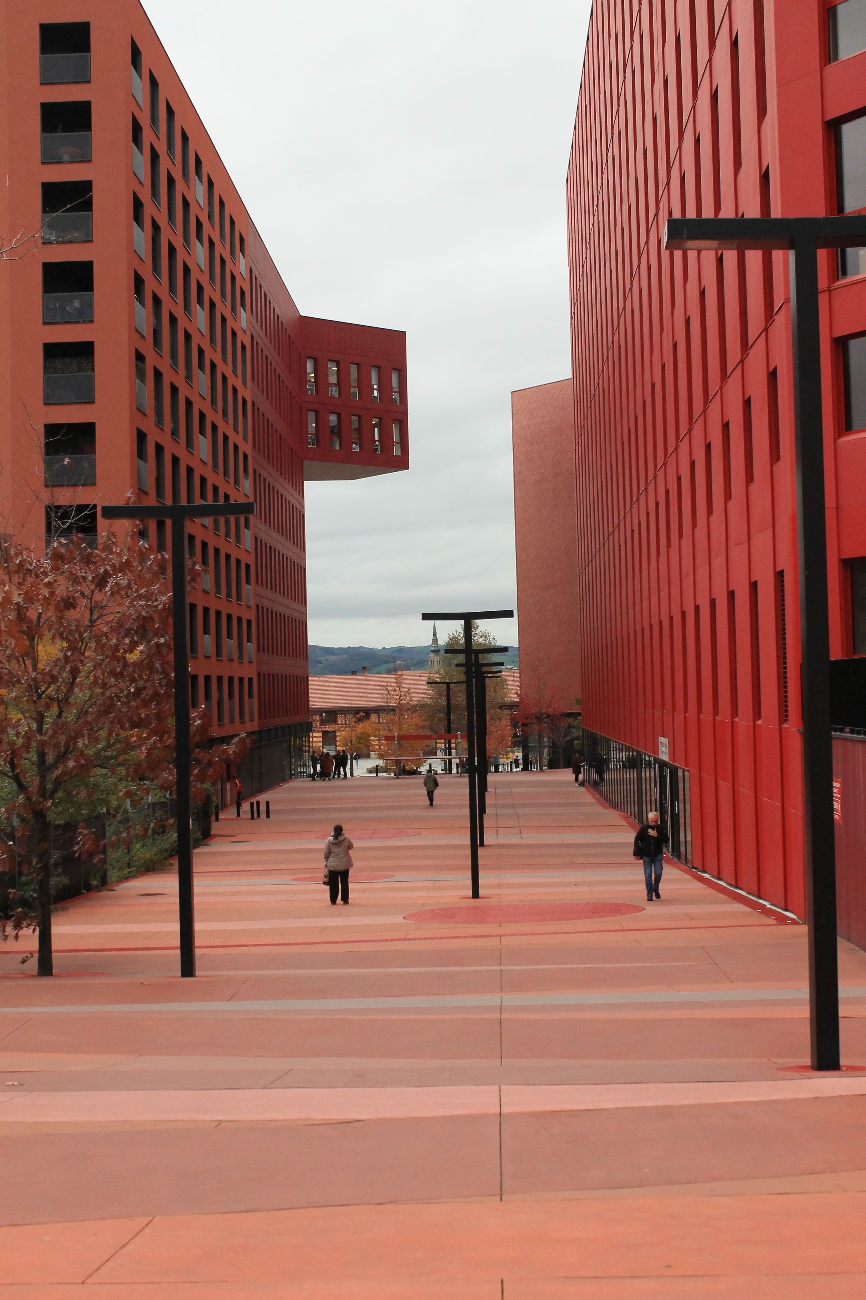 Modern Architectural Campus with Red Facades · Free Stock Photo
