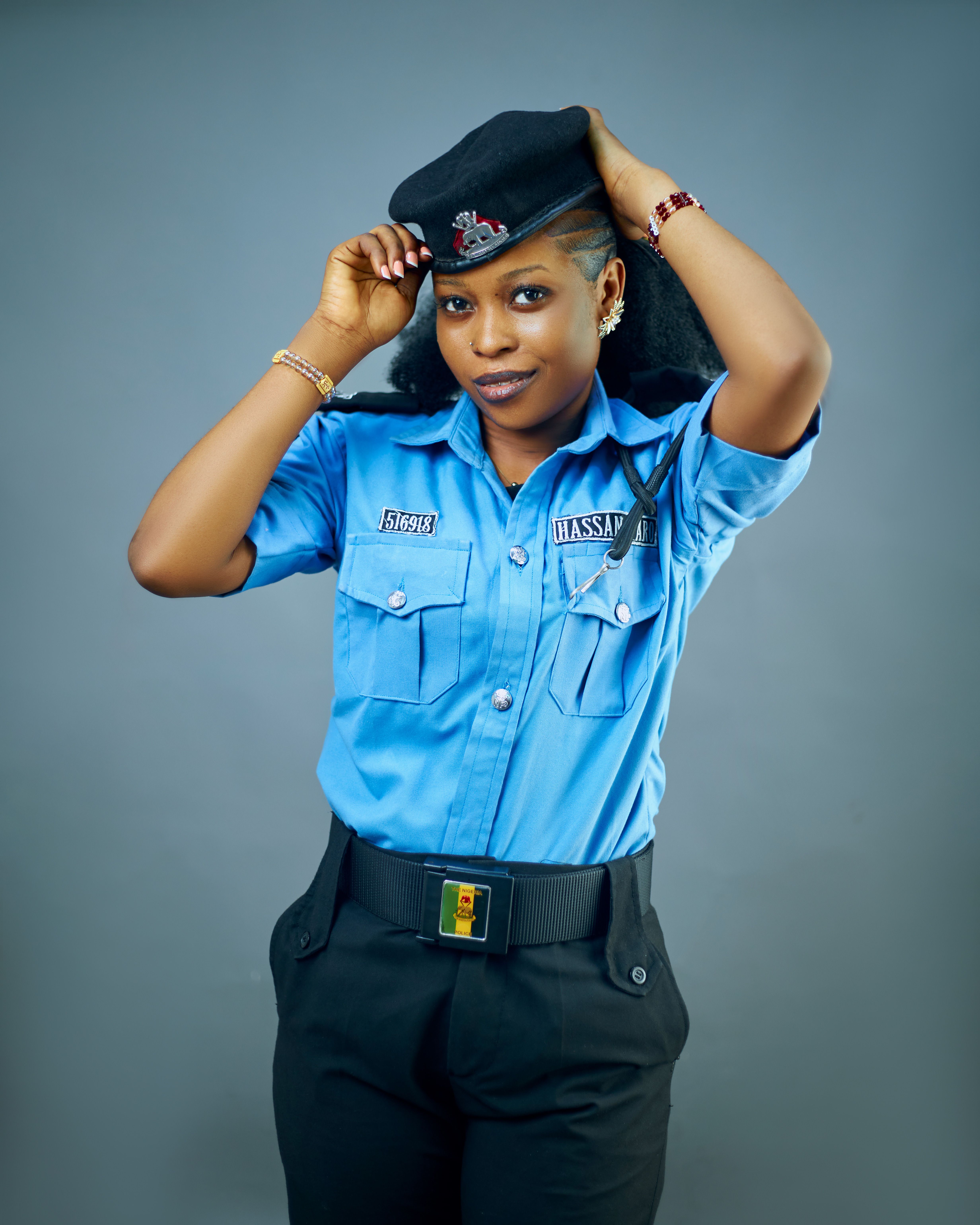 Confident Female Police Officer in Uniform · Free Stock Photo