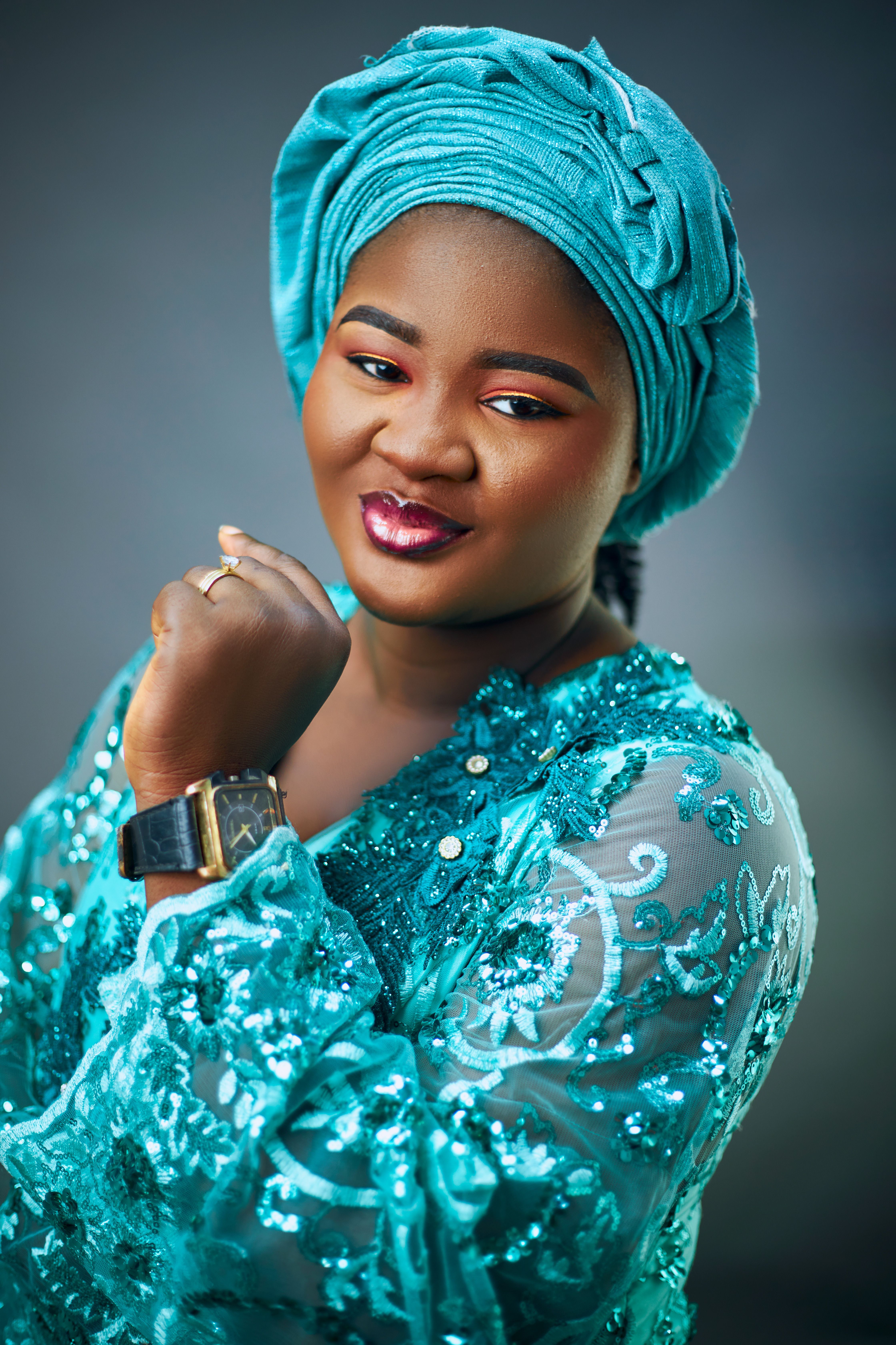 Elegant Woman in Turquoise Traditional Attire · Free Stock Photo