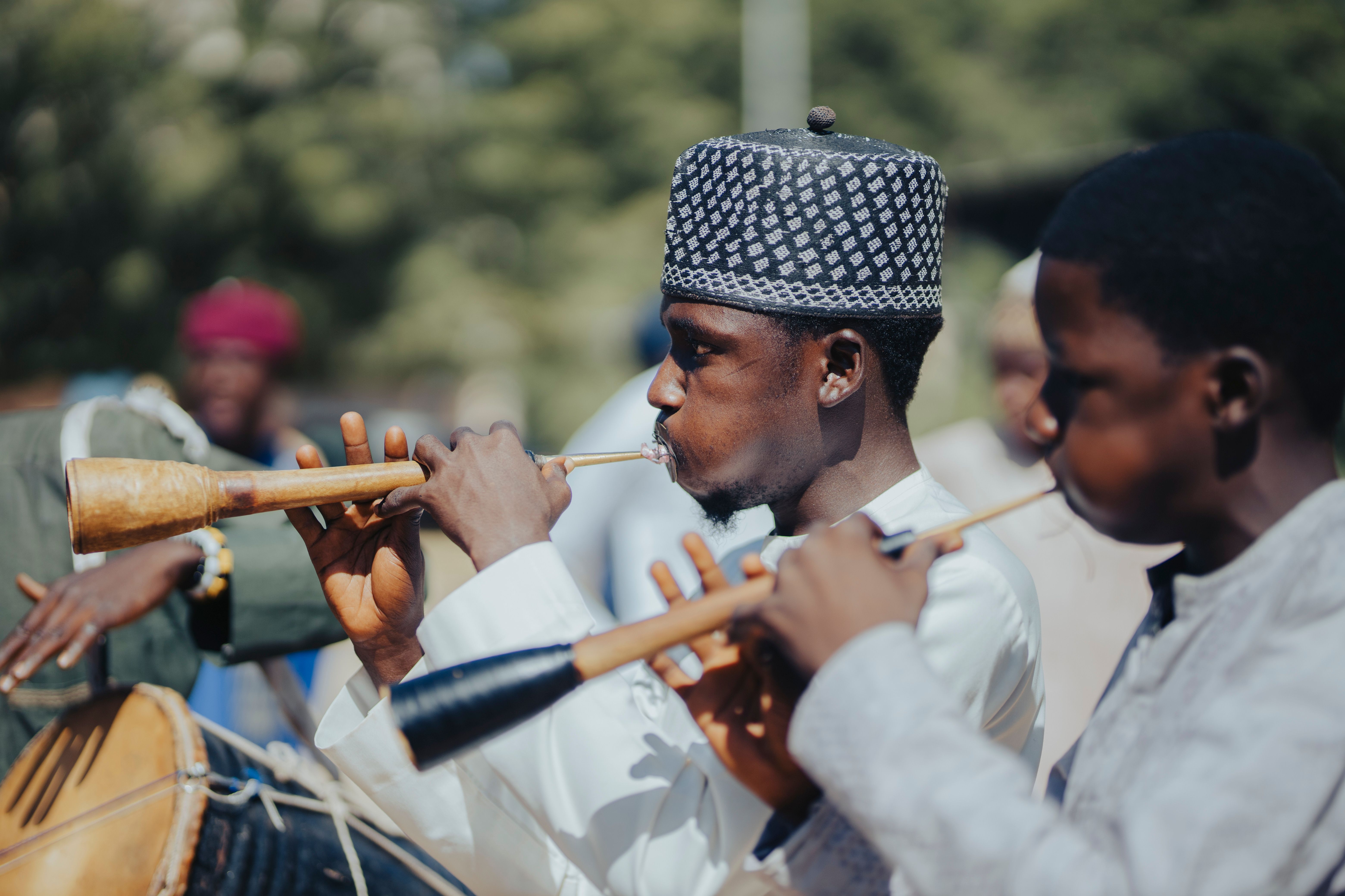 Traditional African Musicians Playing Wooden Pipes · Free Stock Photo