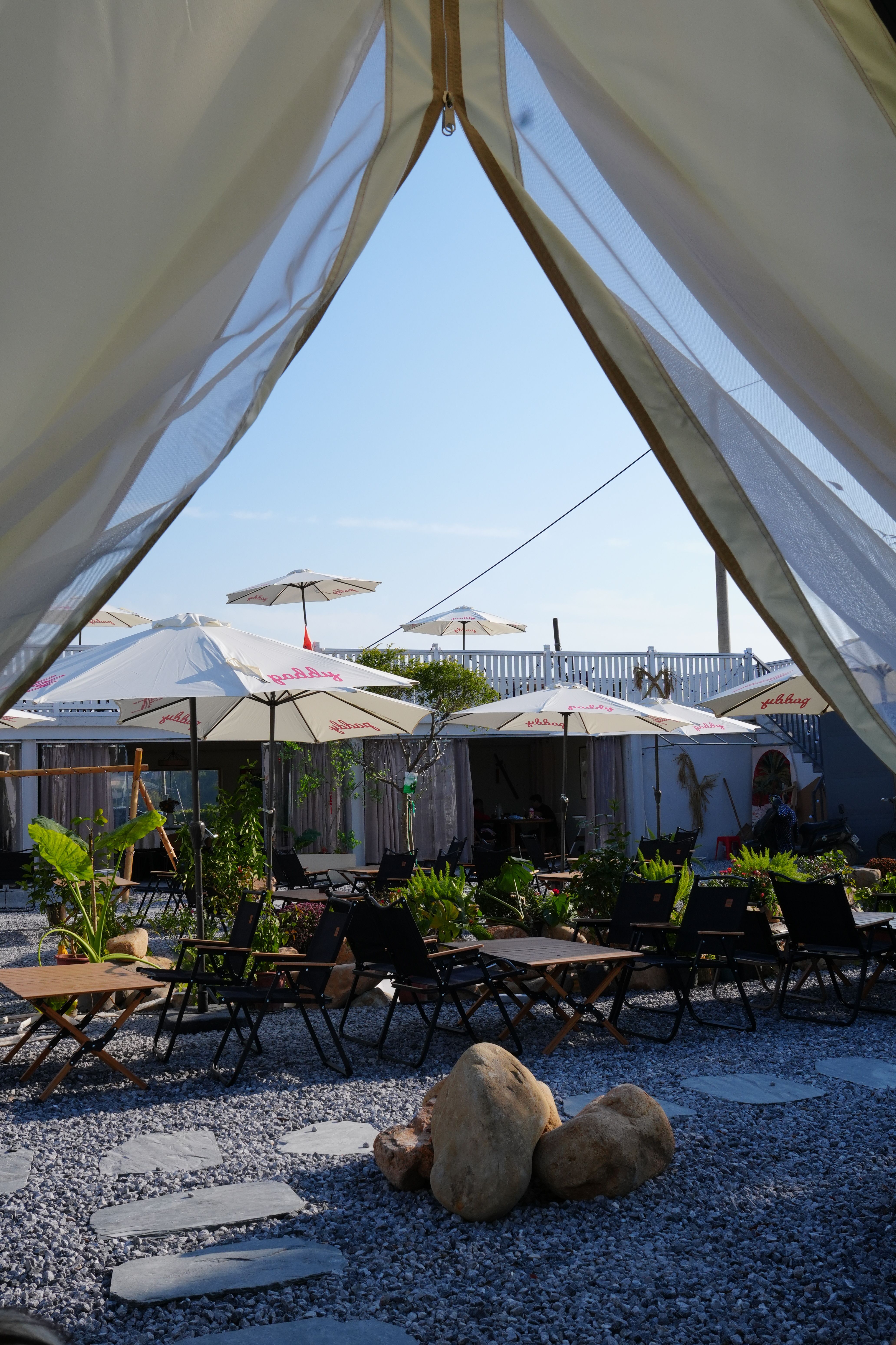 Outdoor Café Seating with Teepee View · Free Stock Photo