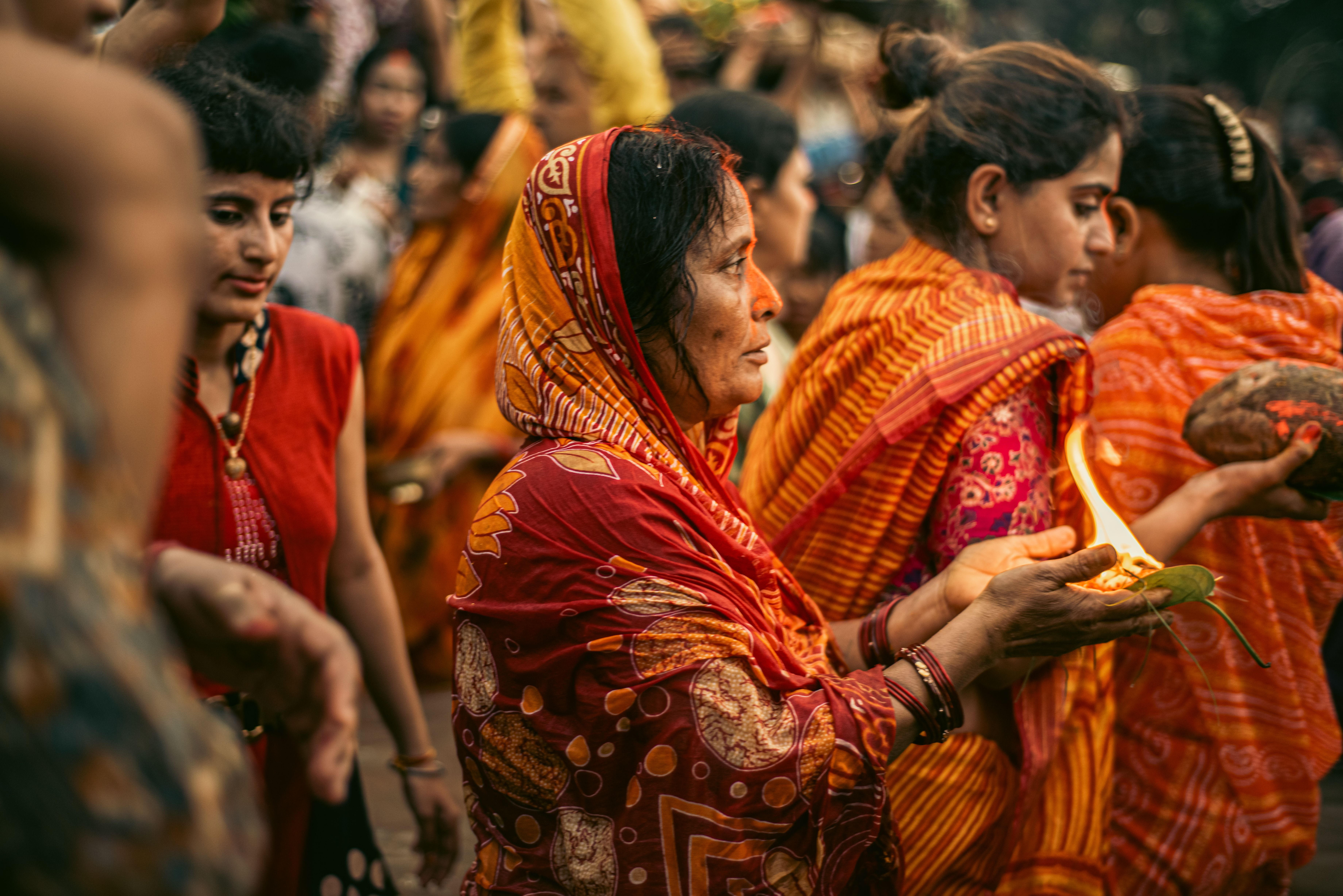 Vibrant Indian Woman with Traditional Lamp · Free Stock Photo