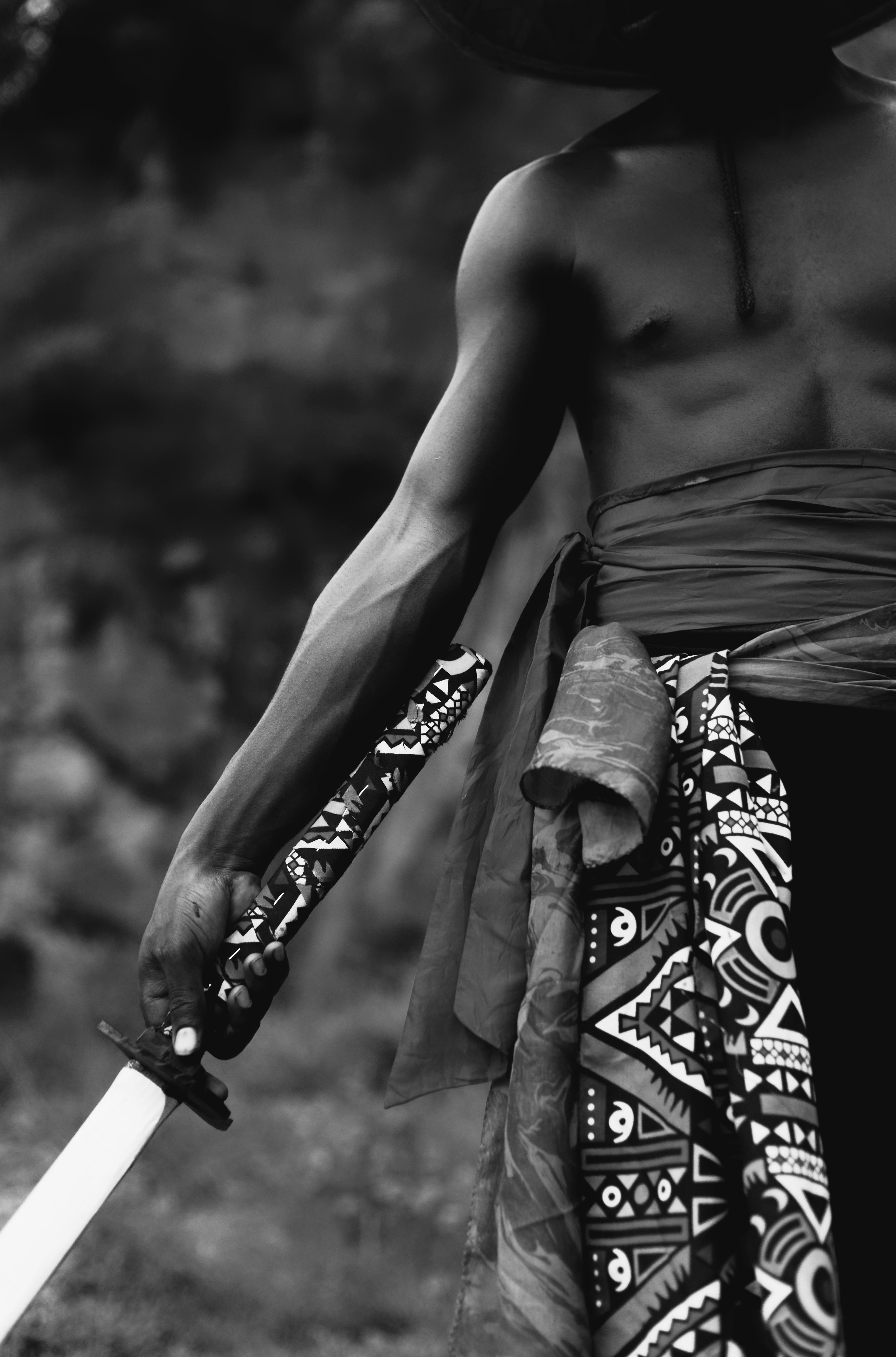 Dynamic Black and White Warrior Holding Sword · Free Stock Photo