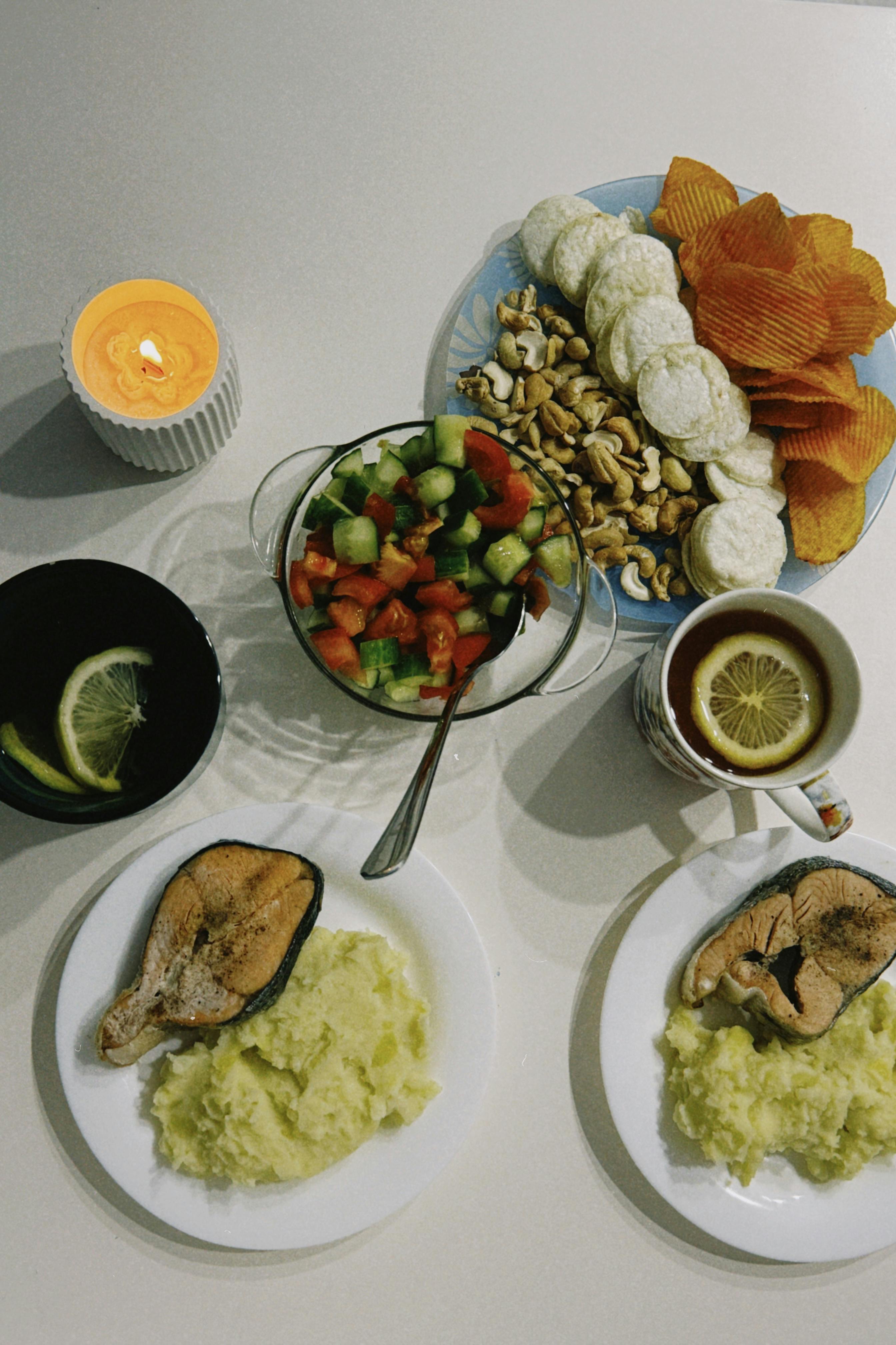 Cozy Dinner with Fish, Salad and Tea · Free Stock Photo