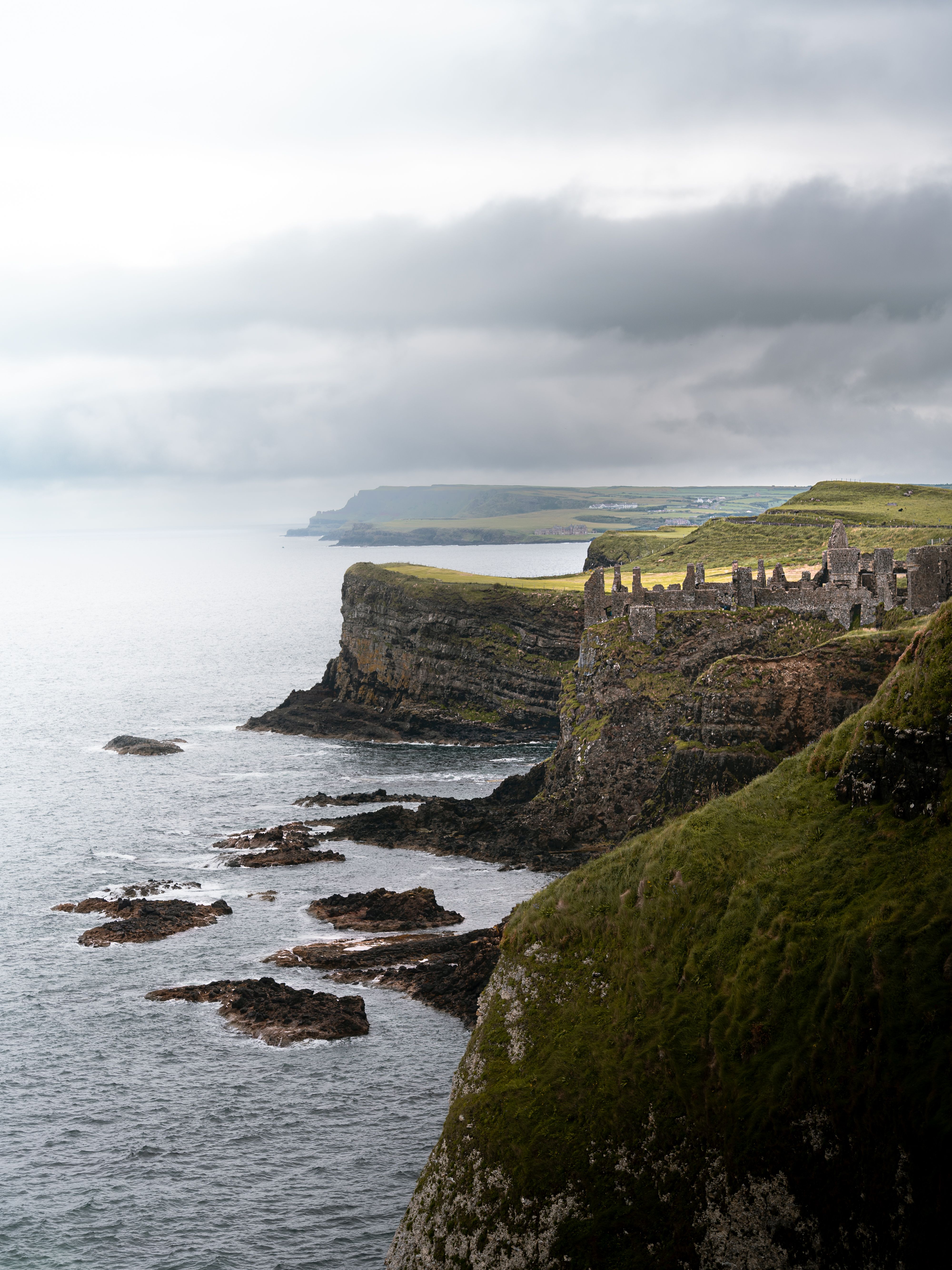 Majestic Cliffs and Ruins on Northern Irish Coast · Free Stock Photo