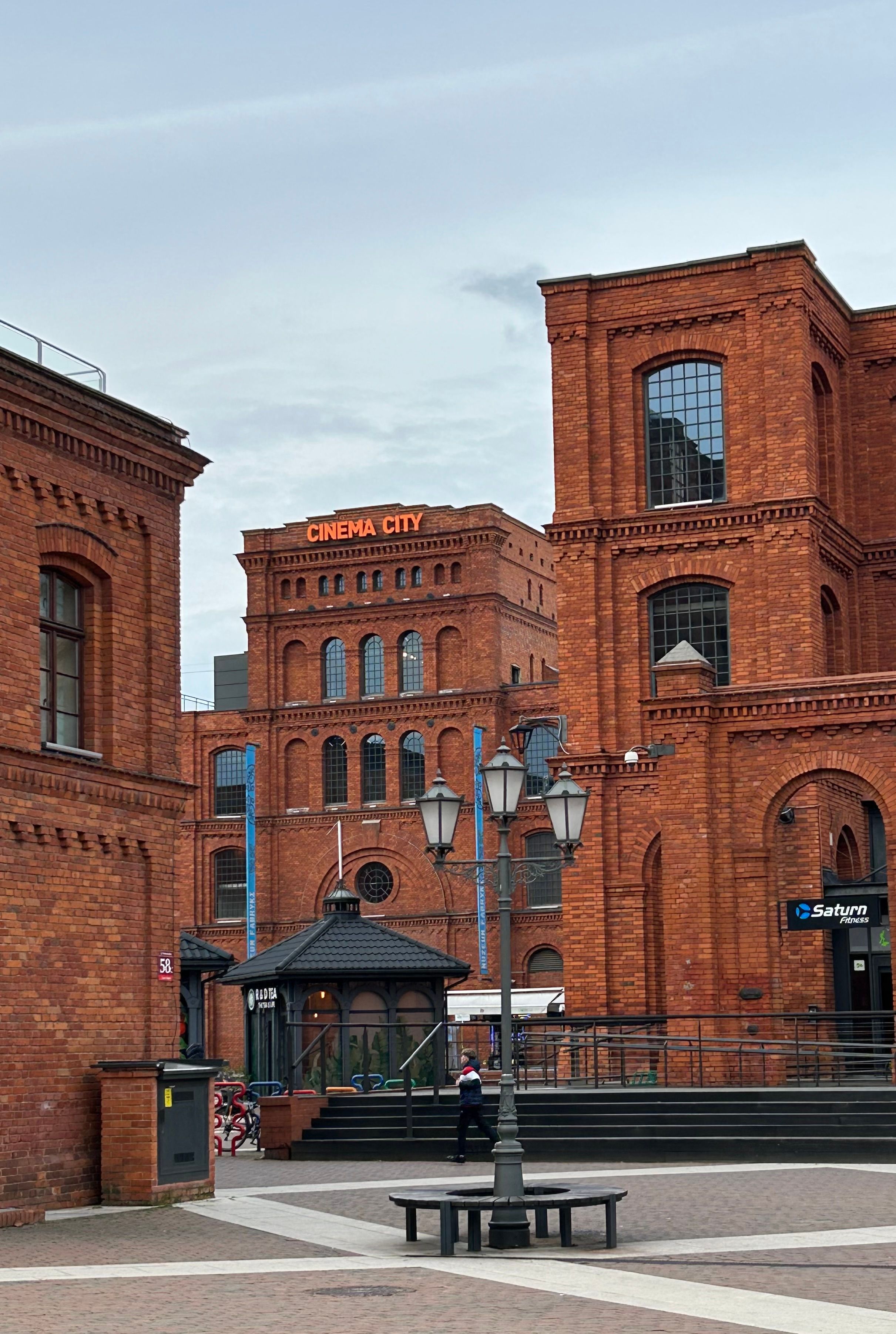 Historic Red Brick Architecture in Urban Setting · Free Stock Photo
