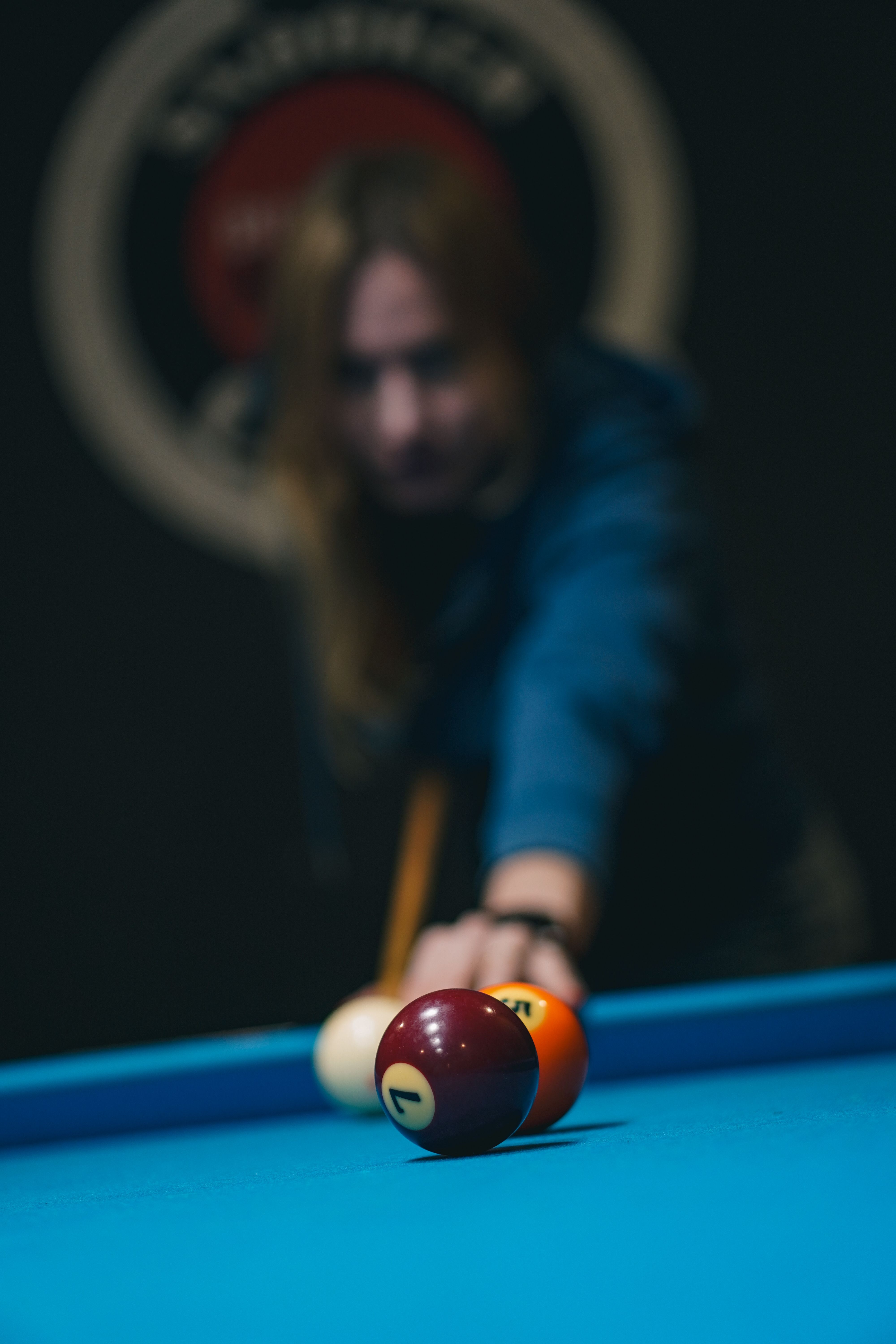 Focused Billiards Player in Kyiv Pool Hall · Free Stock Photo