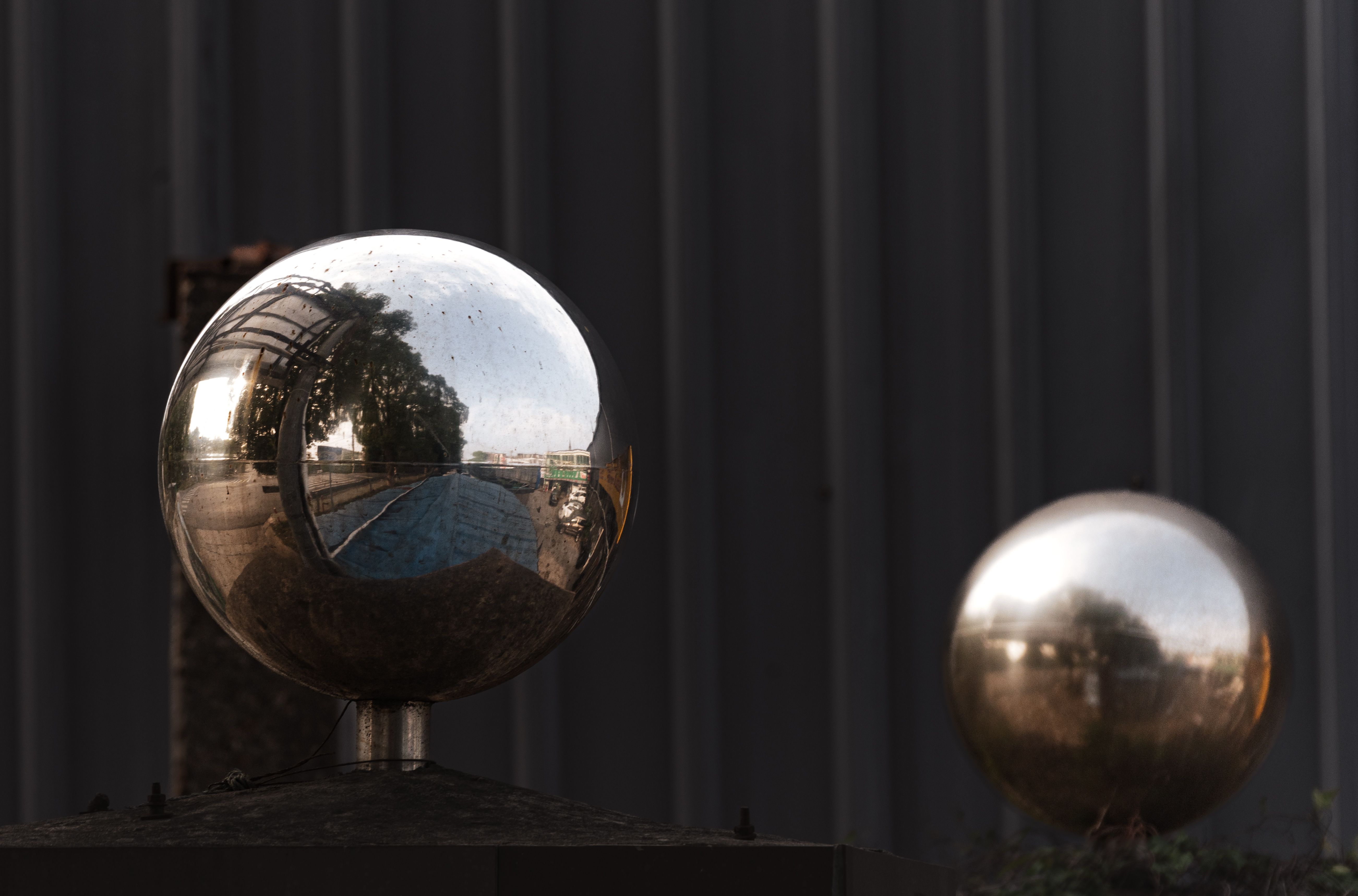 Reflective Metal Spheres with Architectural Details · Free Stock Photo
