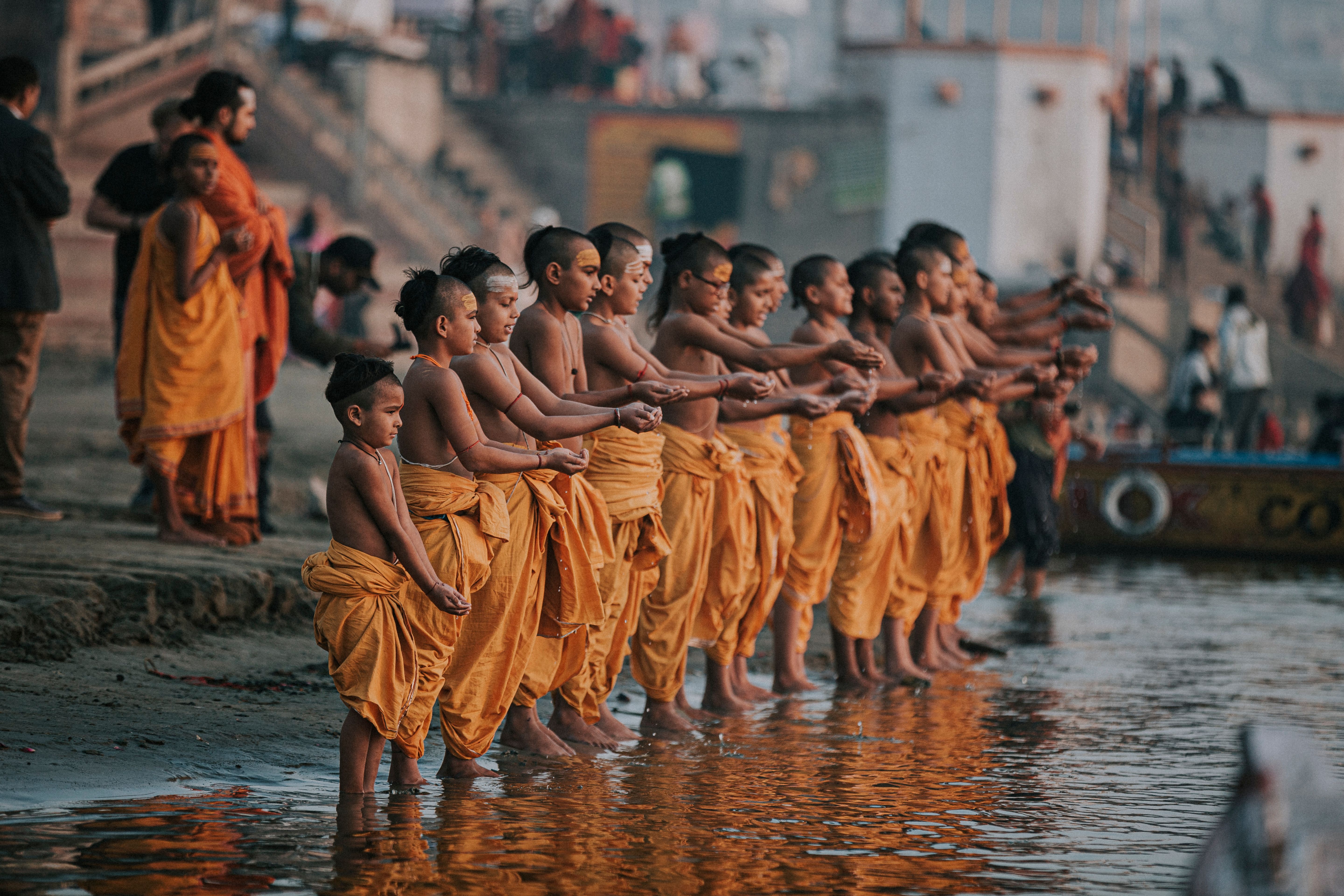 Young Monks Performing Rituals by the Ganges · Free Stock Photo