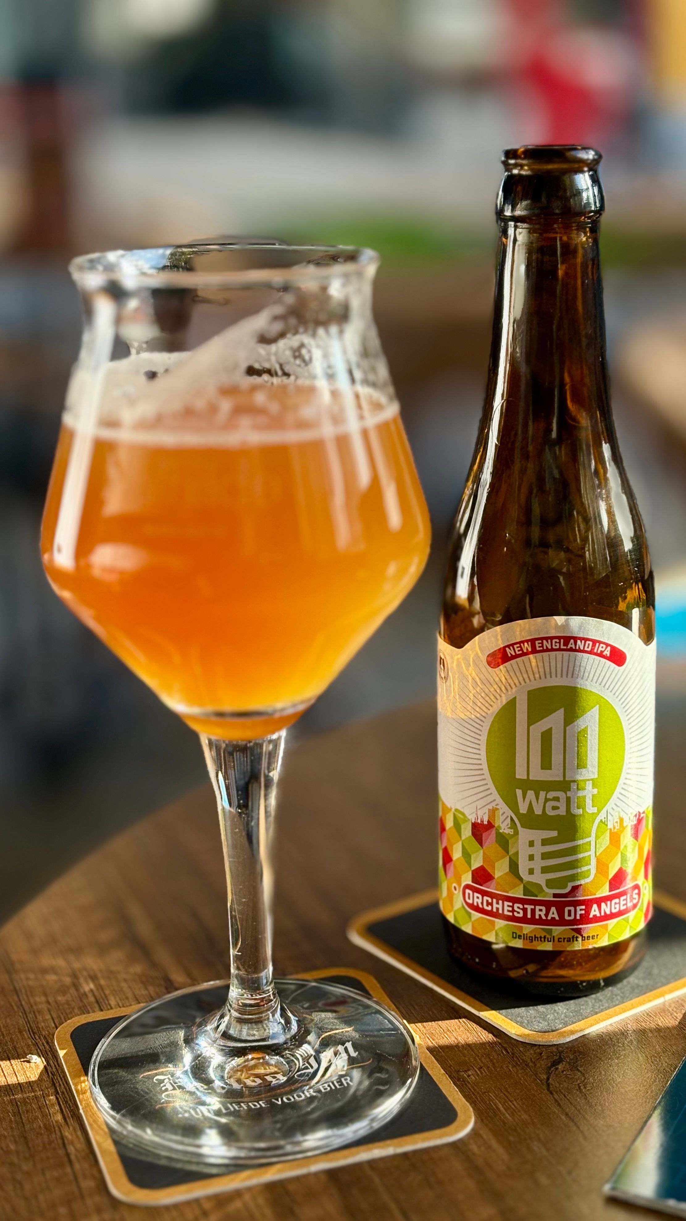 Craft Beer in Glass with 100 Watt Bottle · Free Stock Photo
