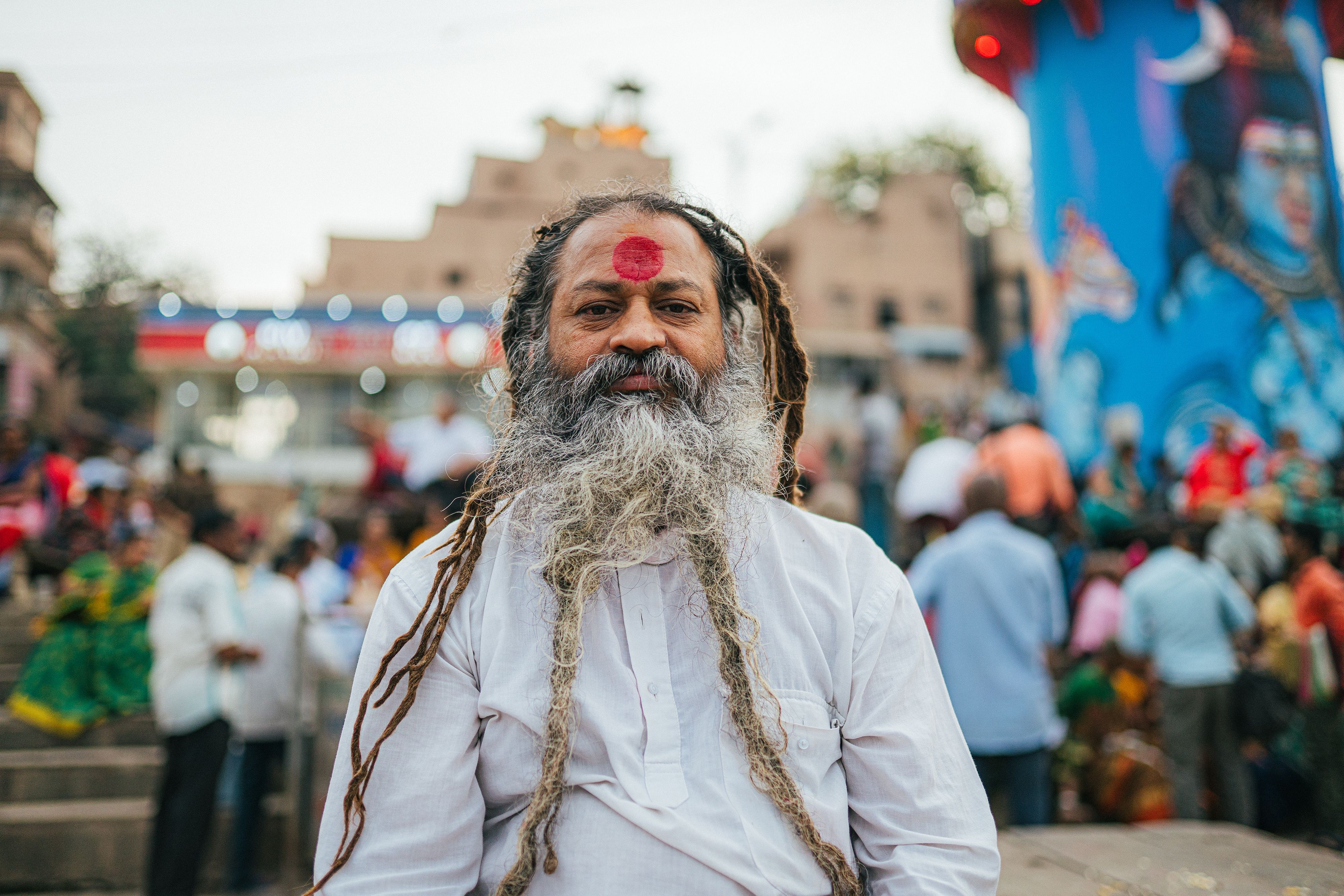 Portrait of a Man in Varanasi Street Scene · Free Stock Photo