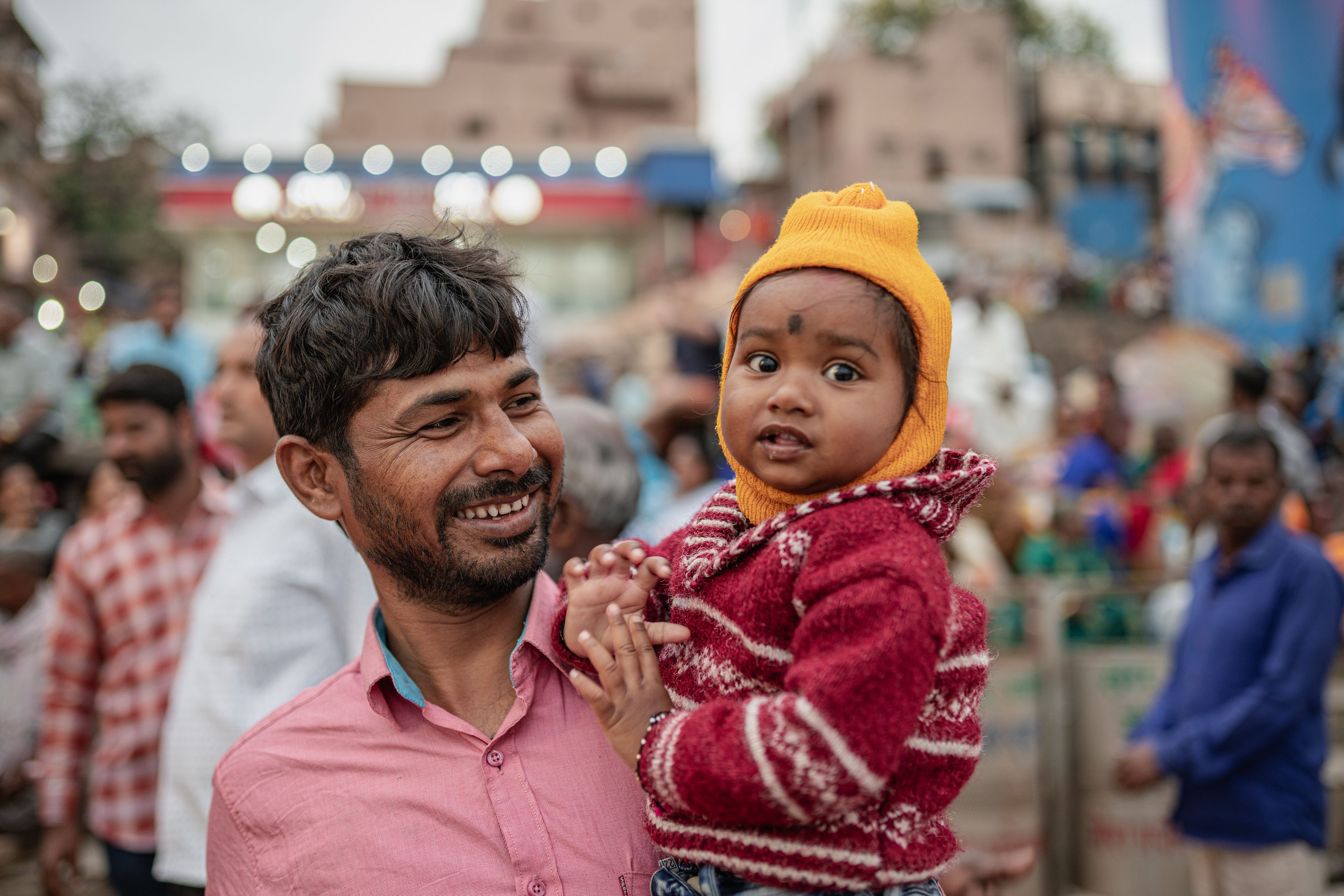Father and Child in Varanasi Street Scene · Free Stock Photo