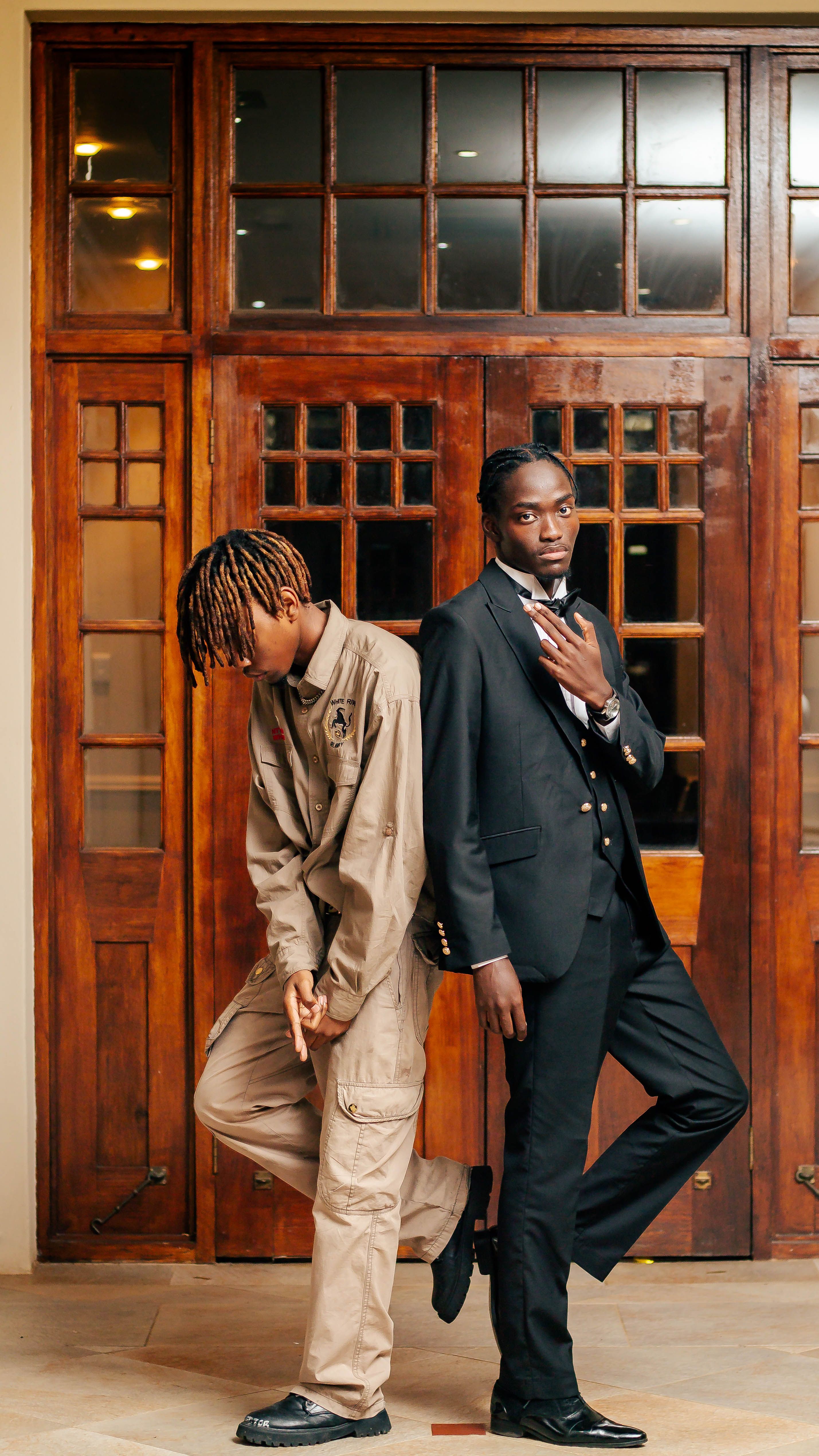 Stylish Portrait of Two Men in Fashionable Outfits · Free Stock Photo