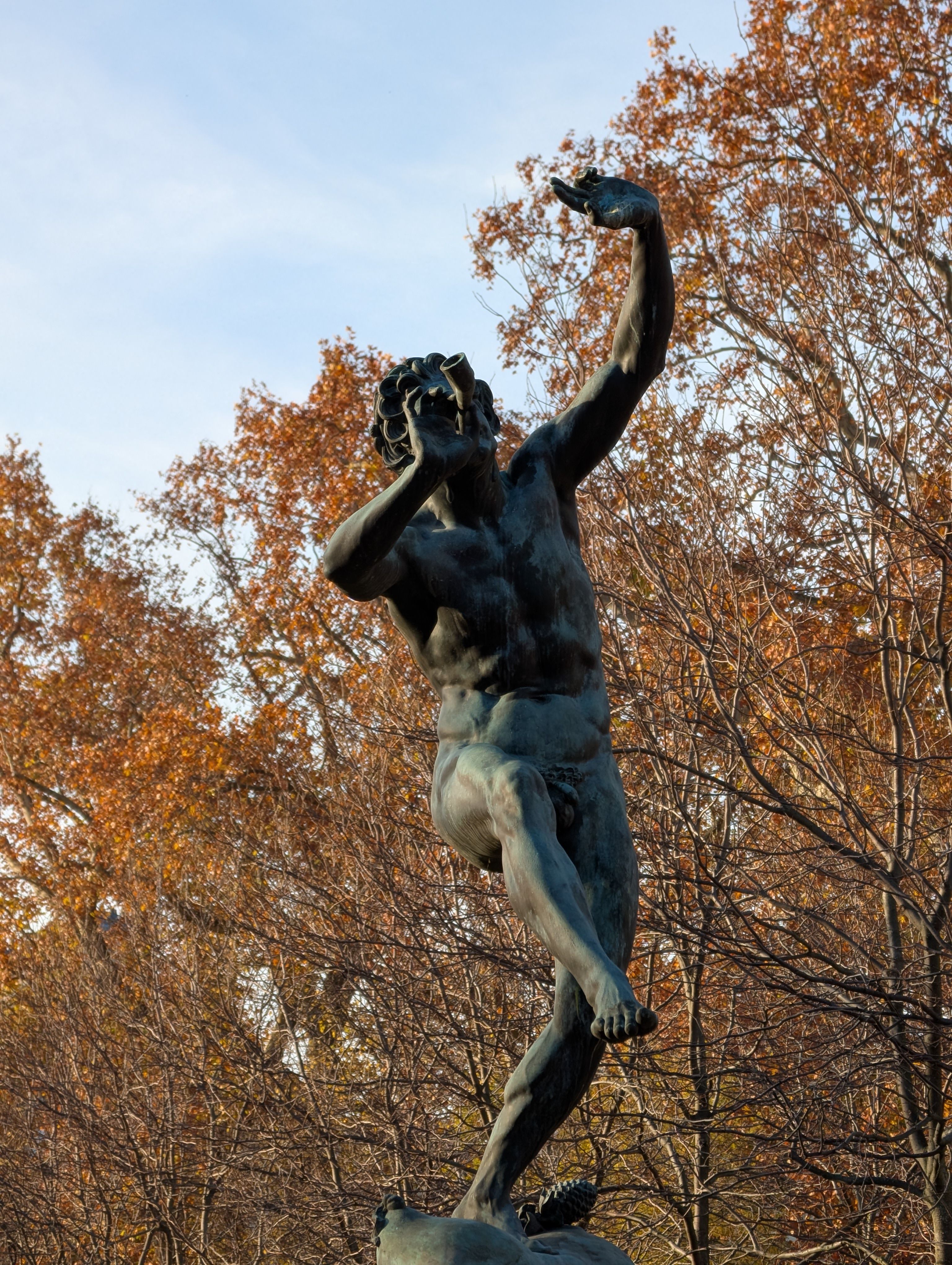 Dynamic Statue Amidst Autumn Trees in Paris Park · Free Stock Photo