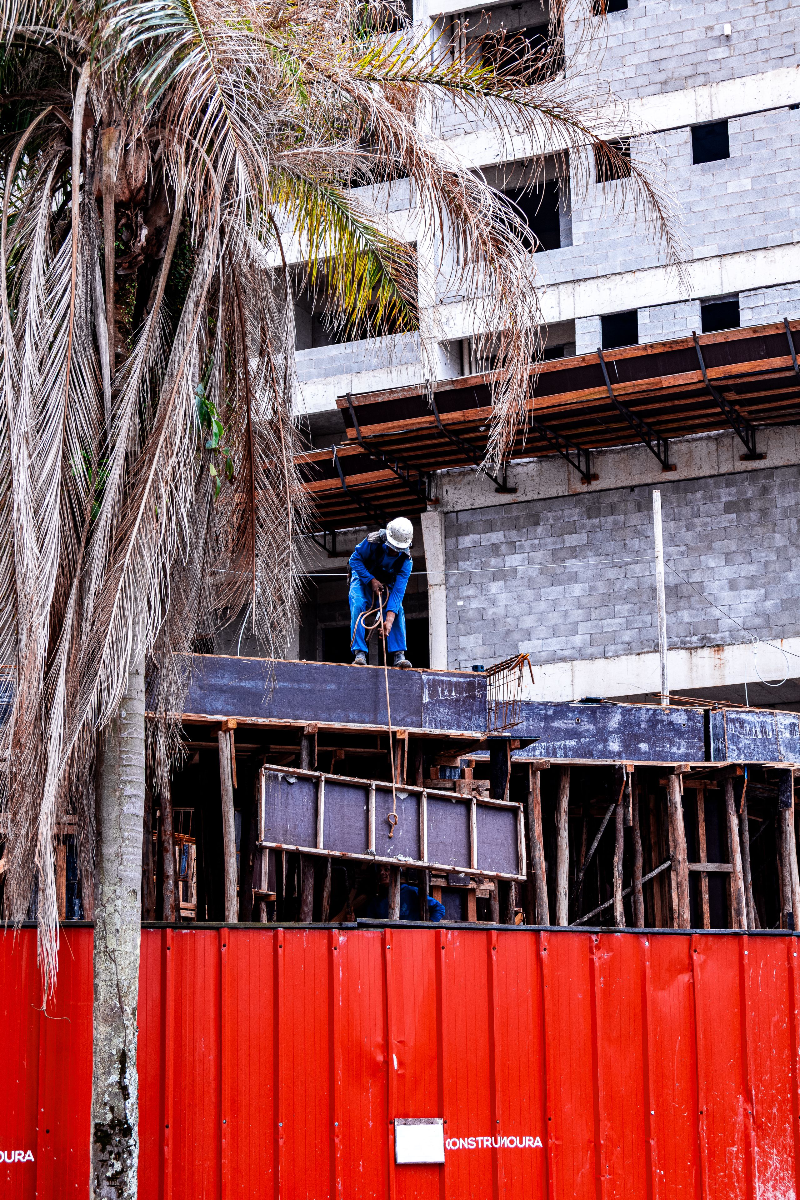 Construction Worker on Site in Praia Grande, Brazil · Free Stock Photo