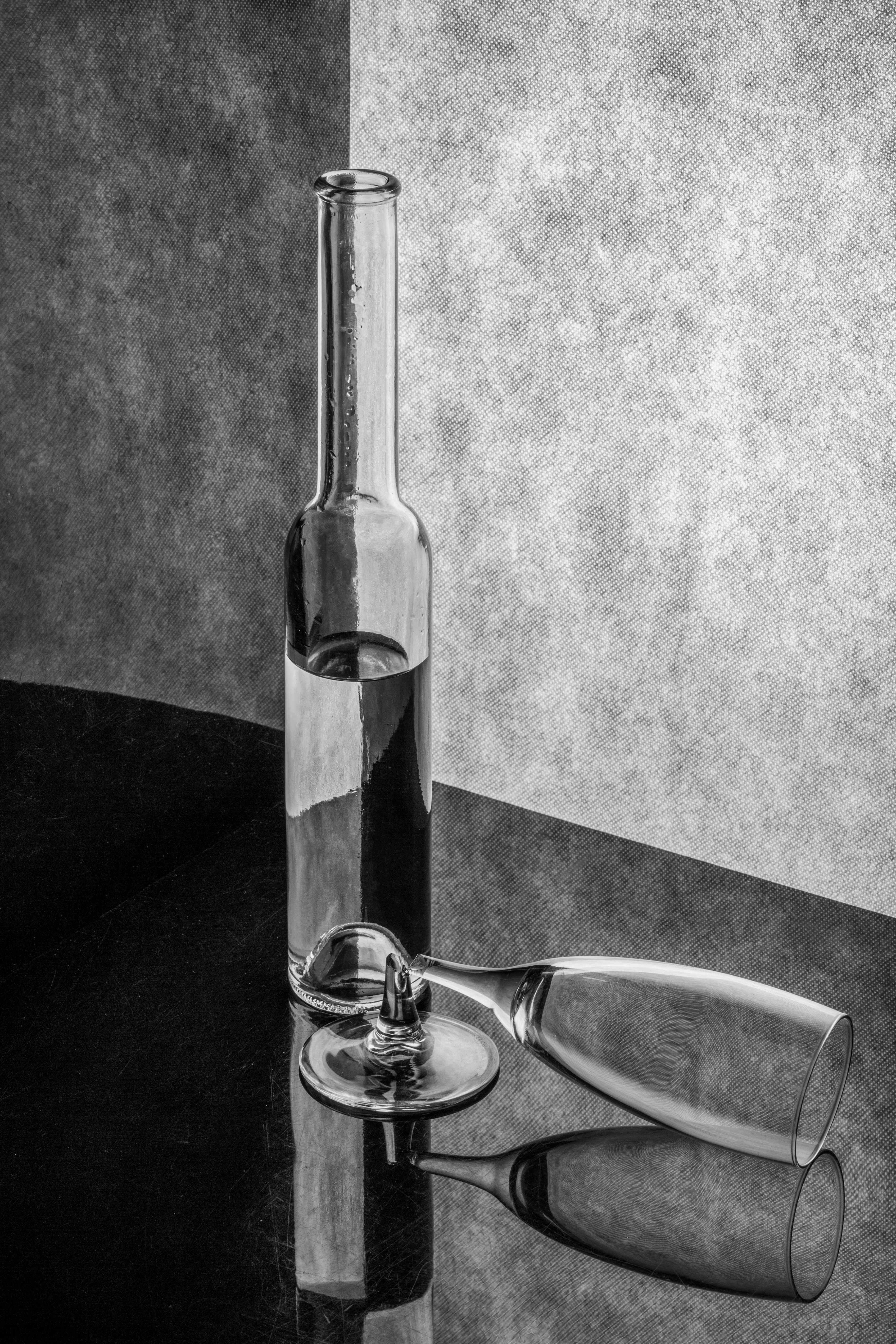 Artistic Black and White Glass Bottle Reflection · Free Stock Photo