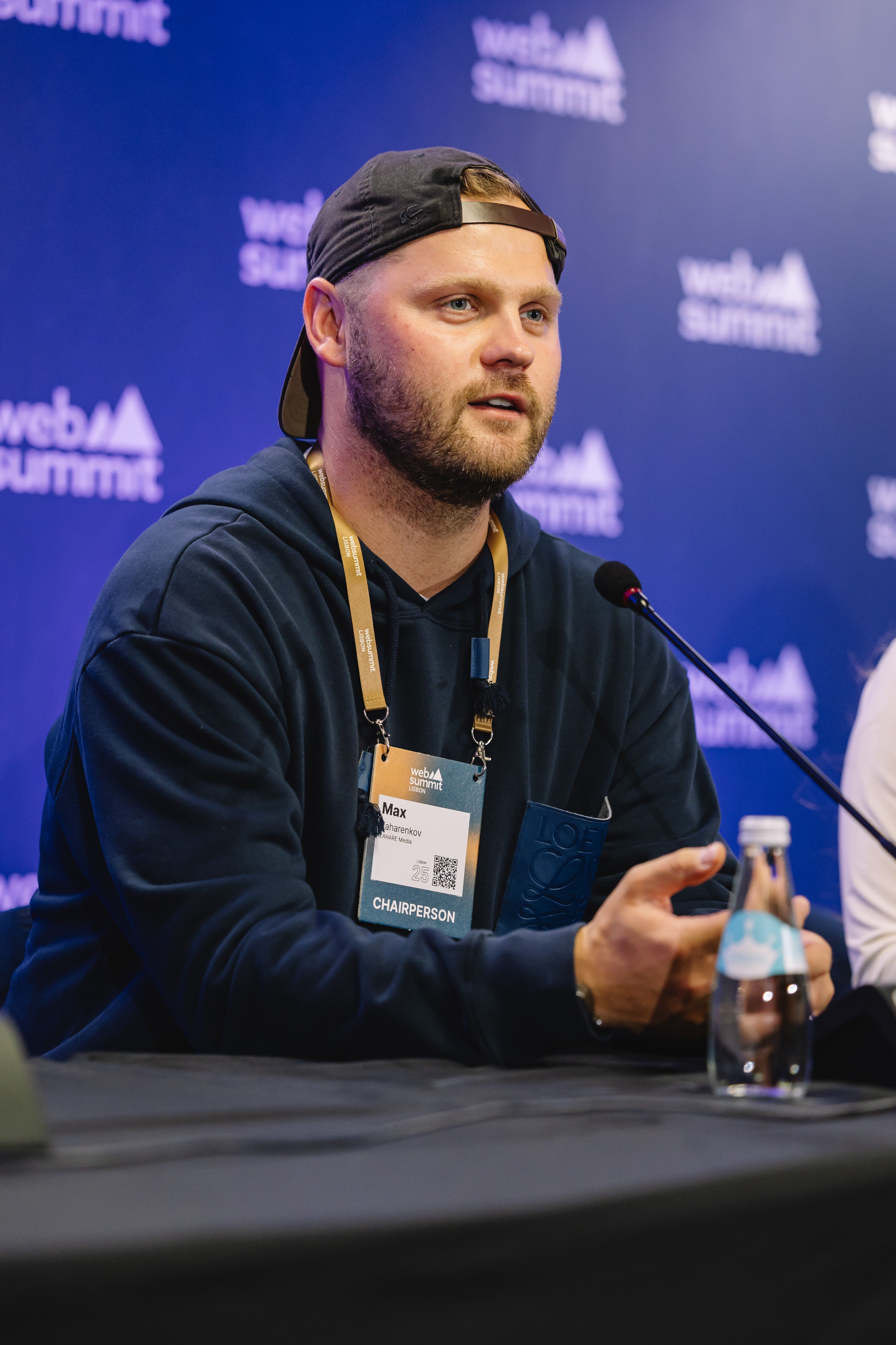 Speaker at Tech Conference During Panel Discussion · Free Stock Photo