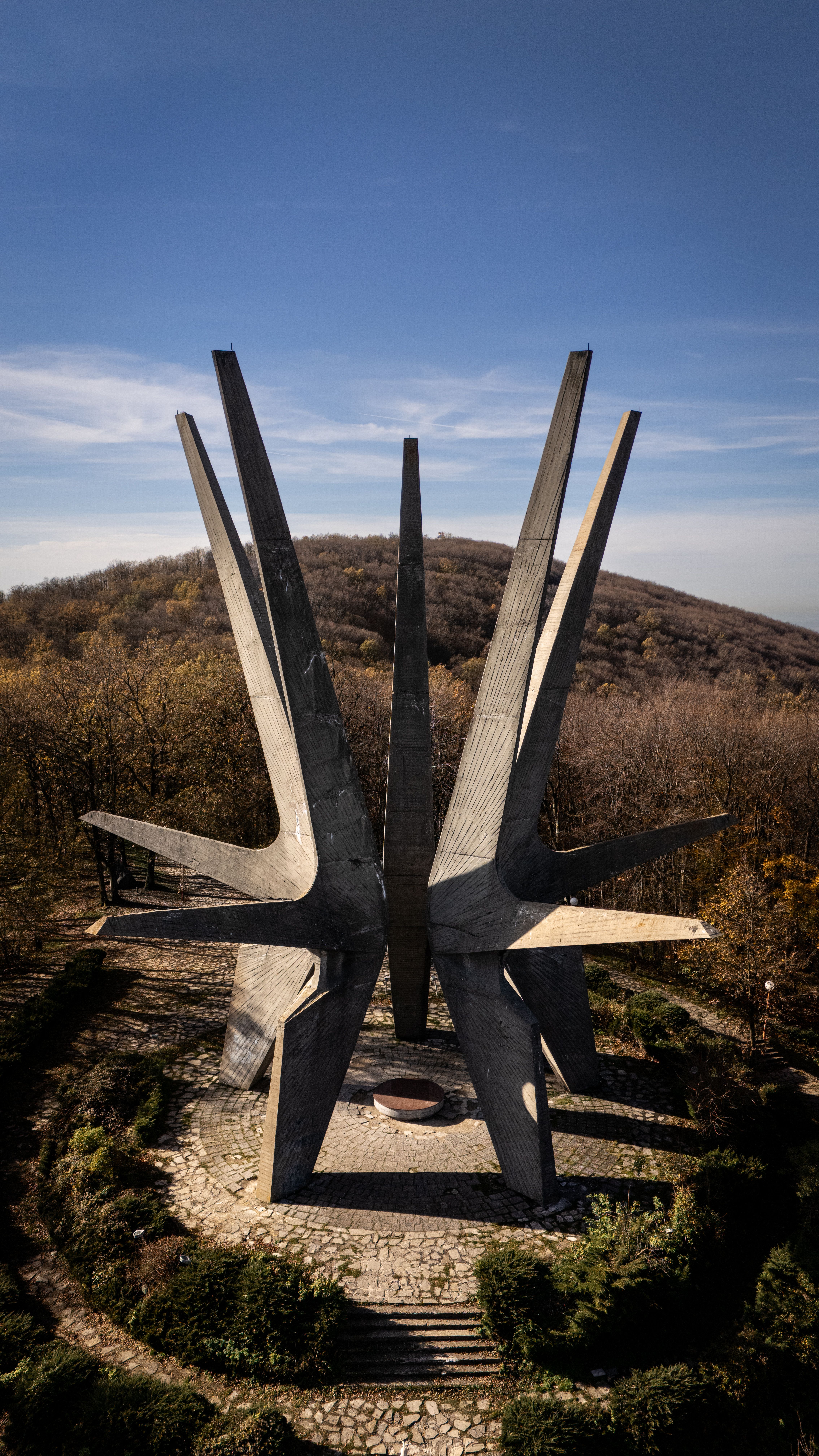 Aerial View of Monument in Autumn Forest Setting · Free Stock Photo