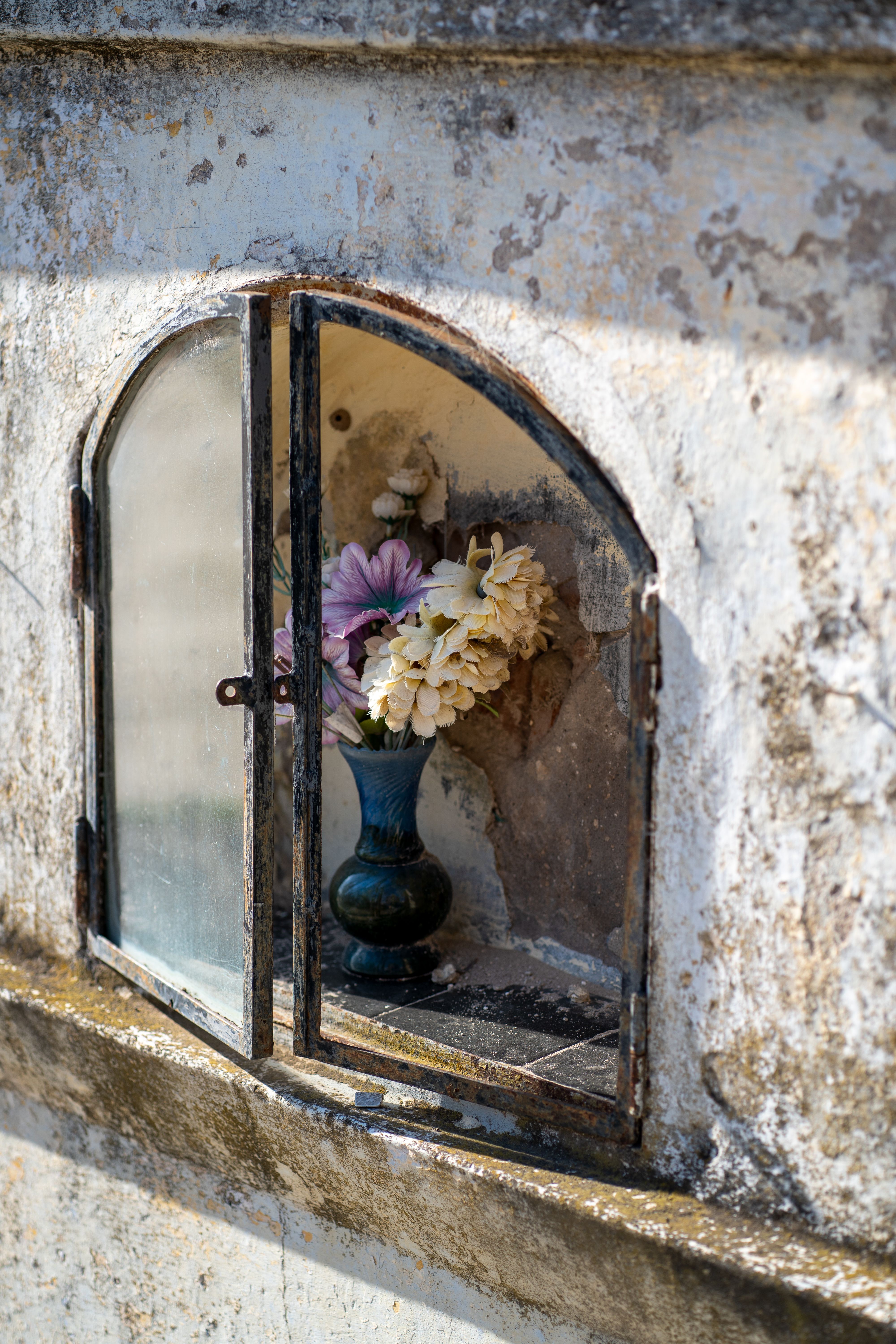 Rustic Cemetery Niche with Flowers in Argentina · Free Stock Photo
