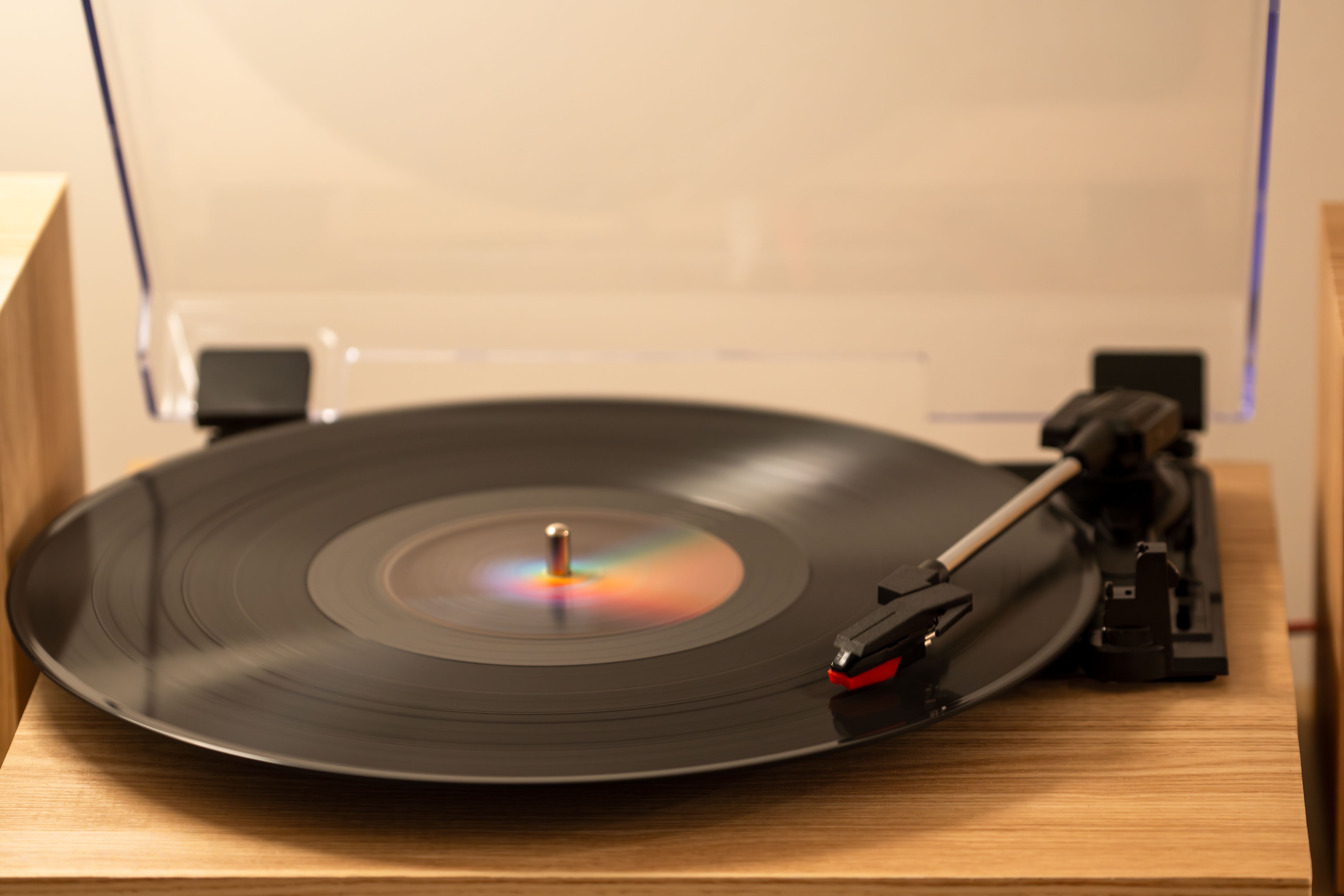 Vintage Turntable with Vinyl Record Spinning · Free Stock Photo