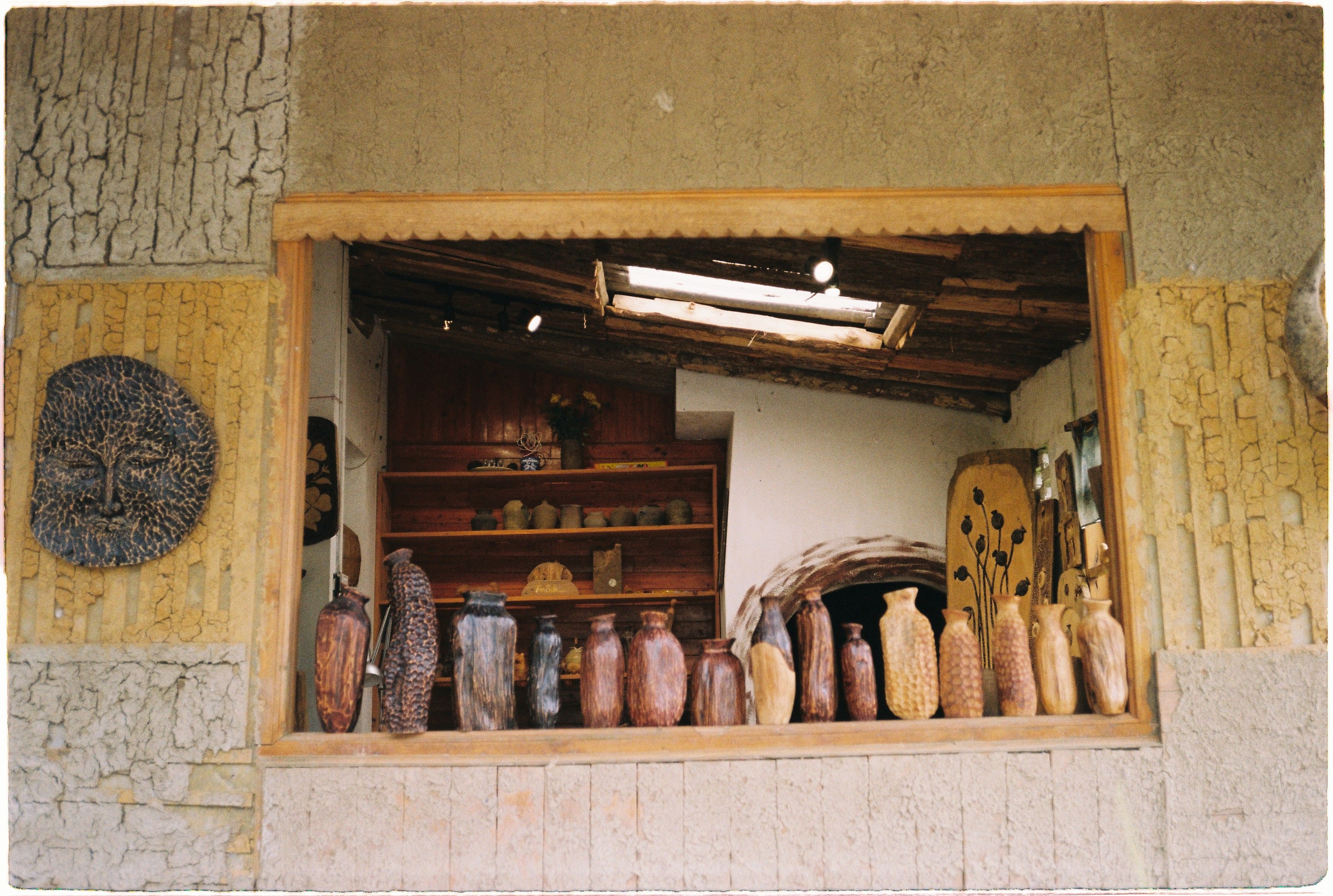 Rustic Pottery Display in Sapa Village Window · Free Stock Photo