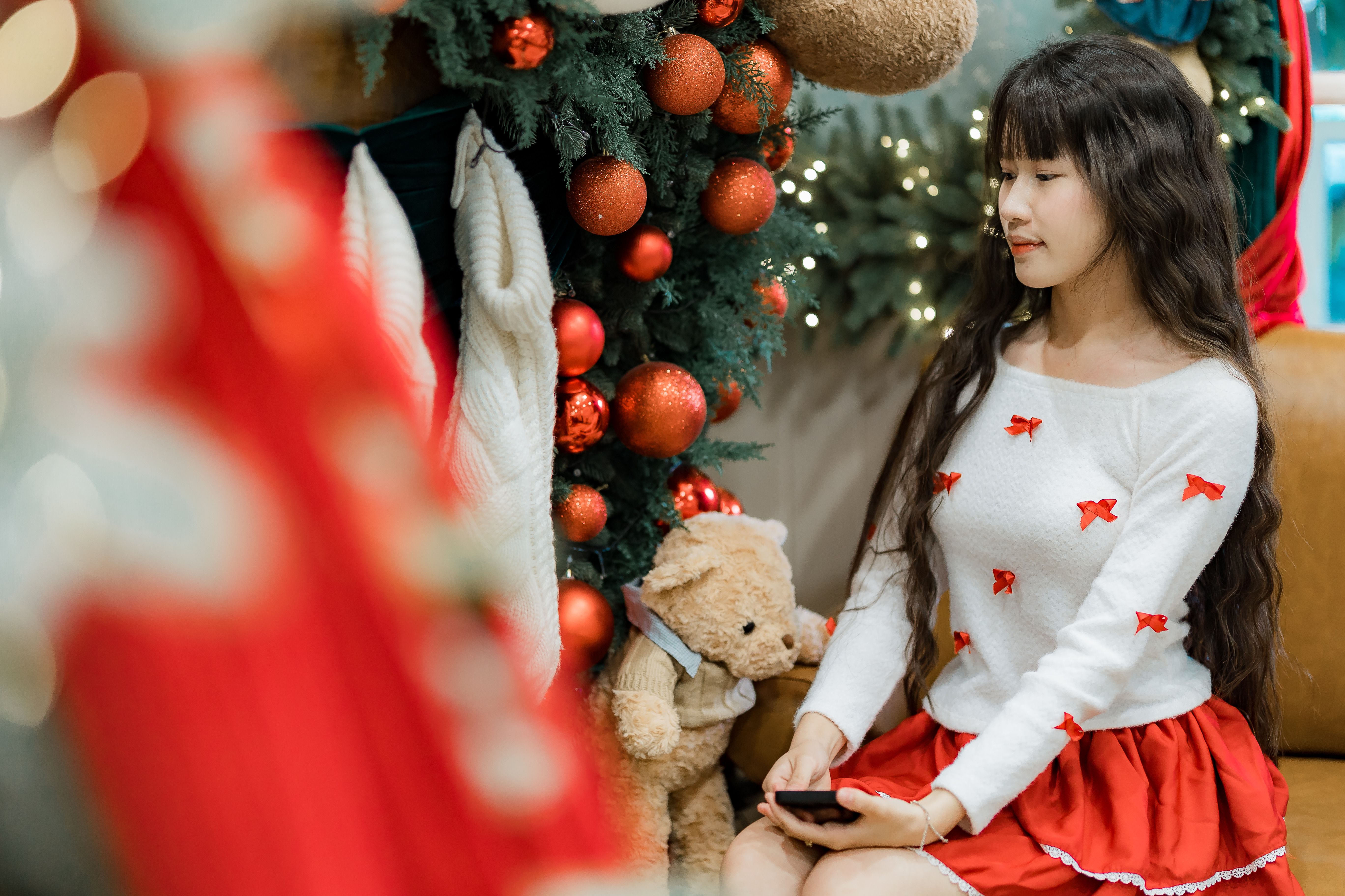 Festive Christmas Scene with Young Woman · Free Stock Photo