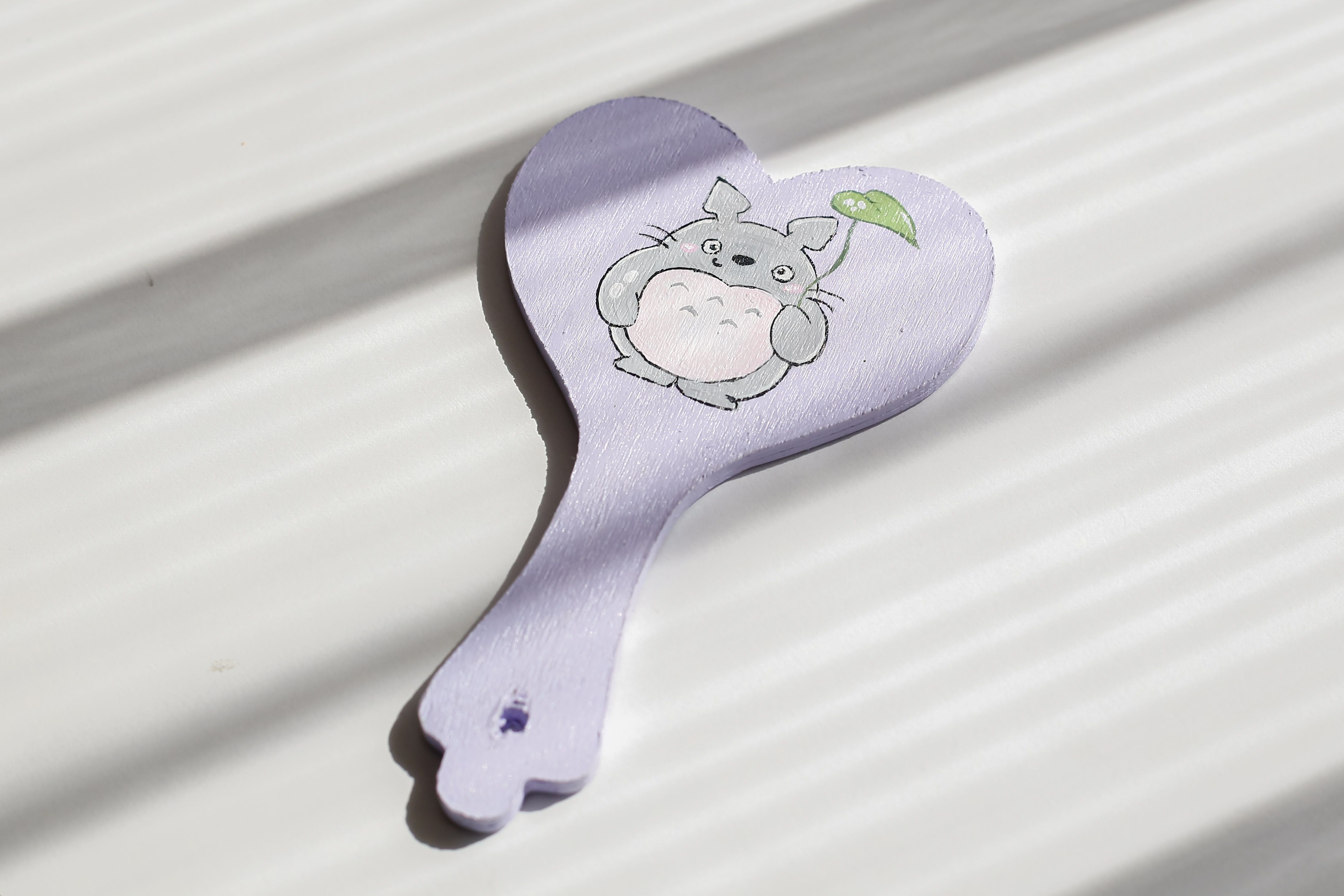 Purple Hand Mirror with Cute Character Illustration · Free Stock Photo