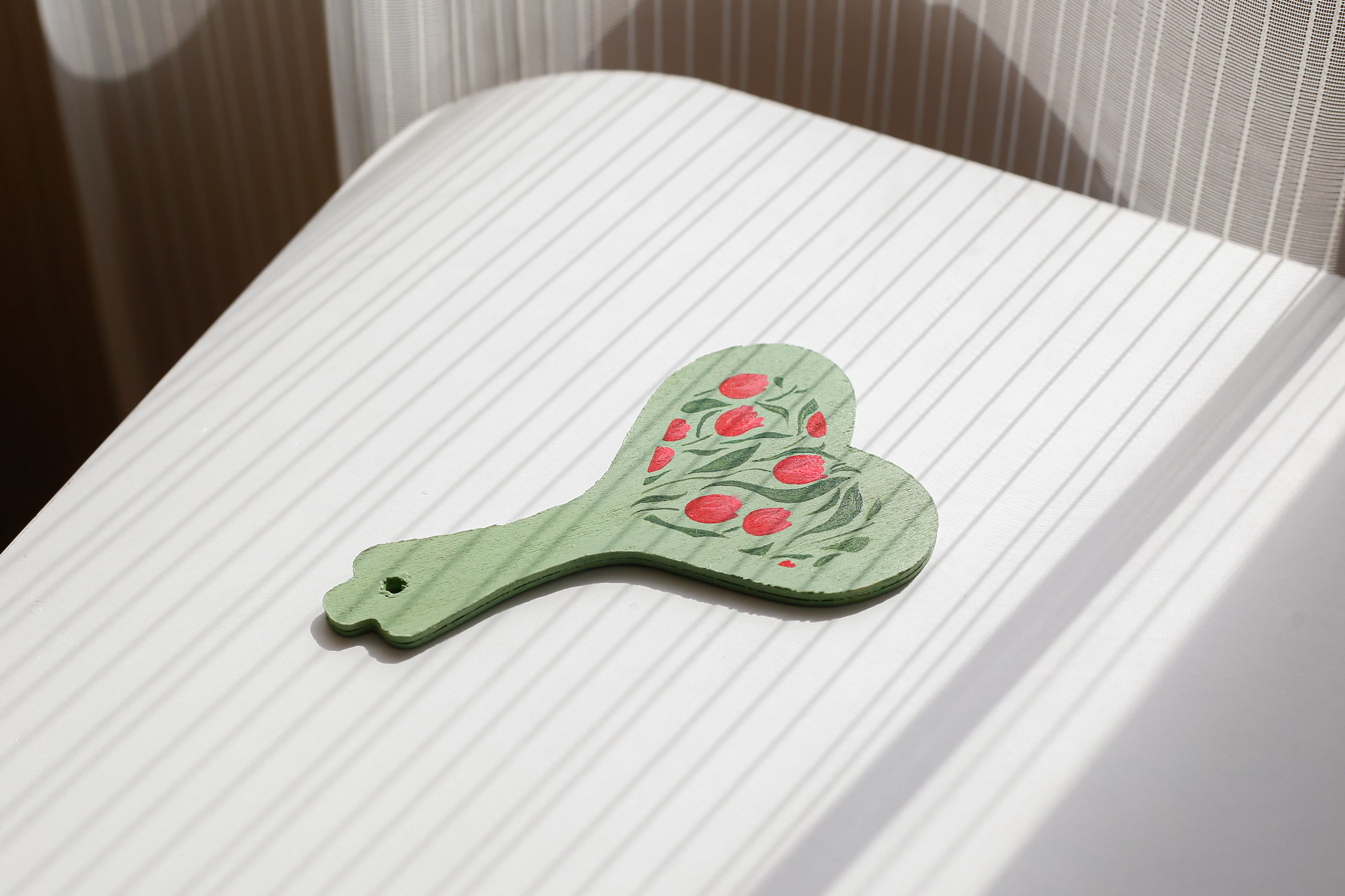 Heart Shaped Wooden Paddle with Painted Apples · Free Stock Photo