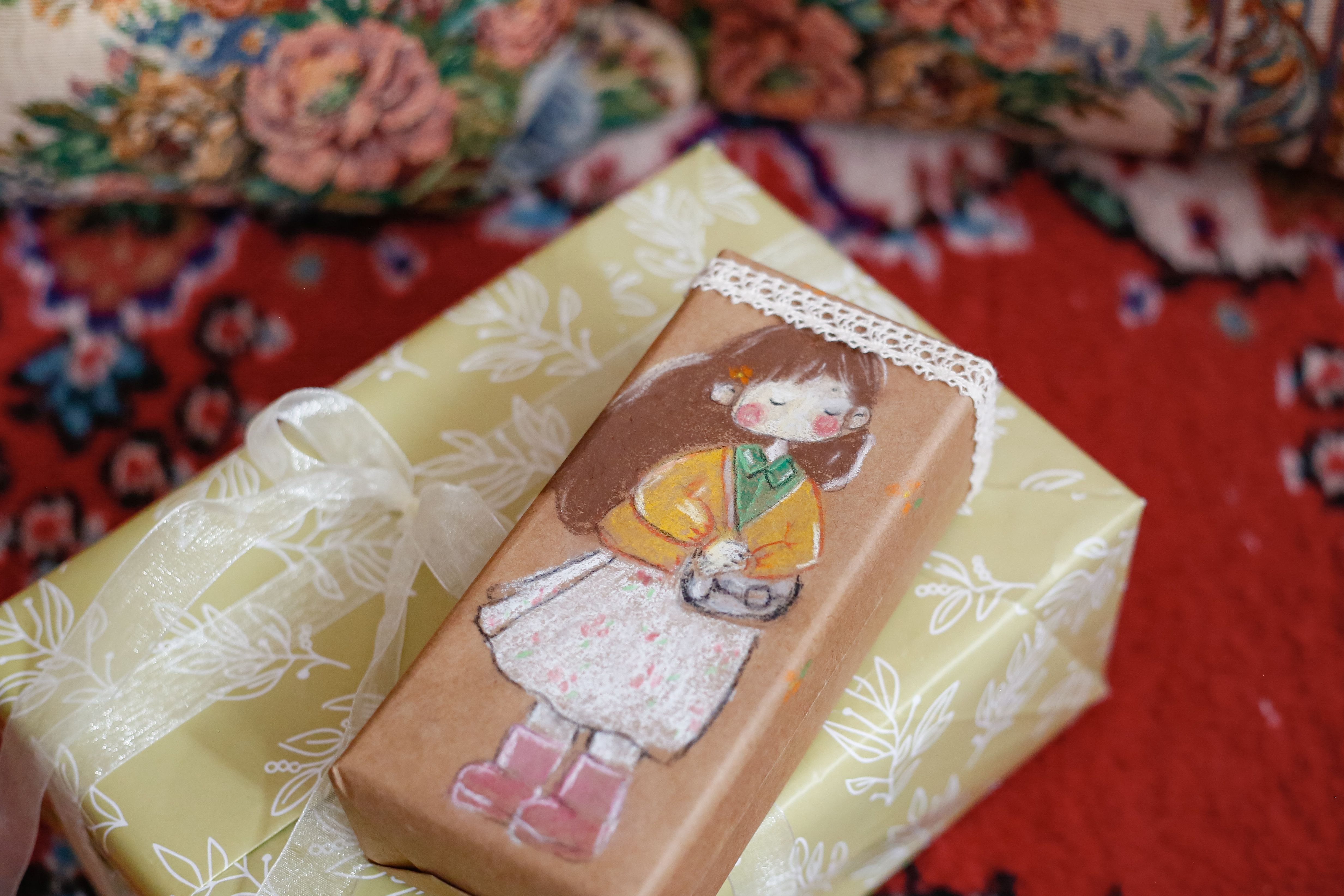 Decorative Gift Box with Hand-Painted Illustration · Free Stock Photo
